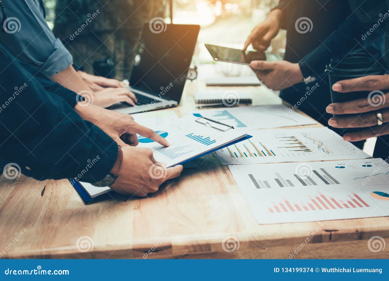 Teamwork with Business People Analysis Cost Graph on Desk at Meeting Room Stock Photo - Image of ...