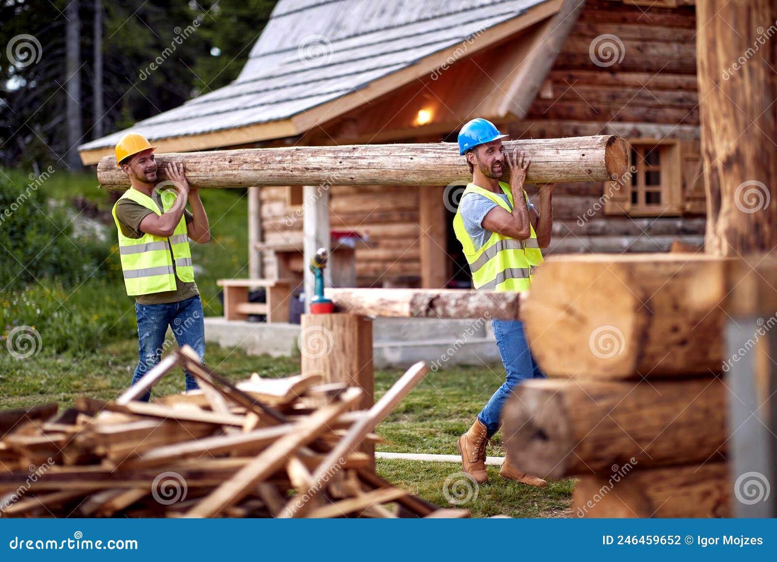 Teamwork .carpenters Holds Wooden Planks on Construction Site Stock ...