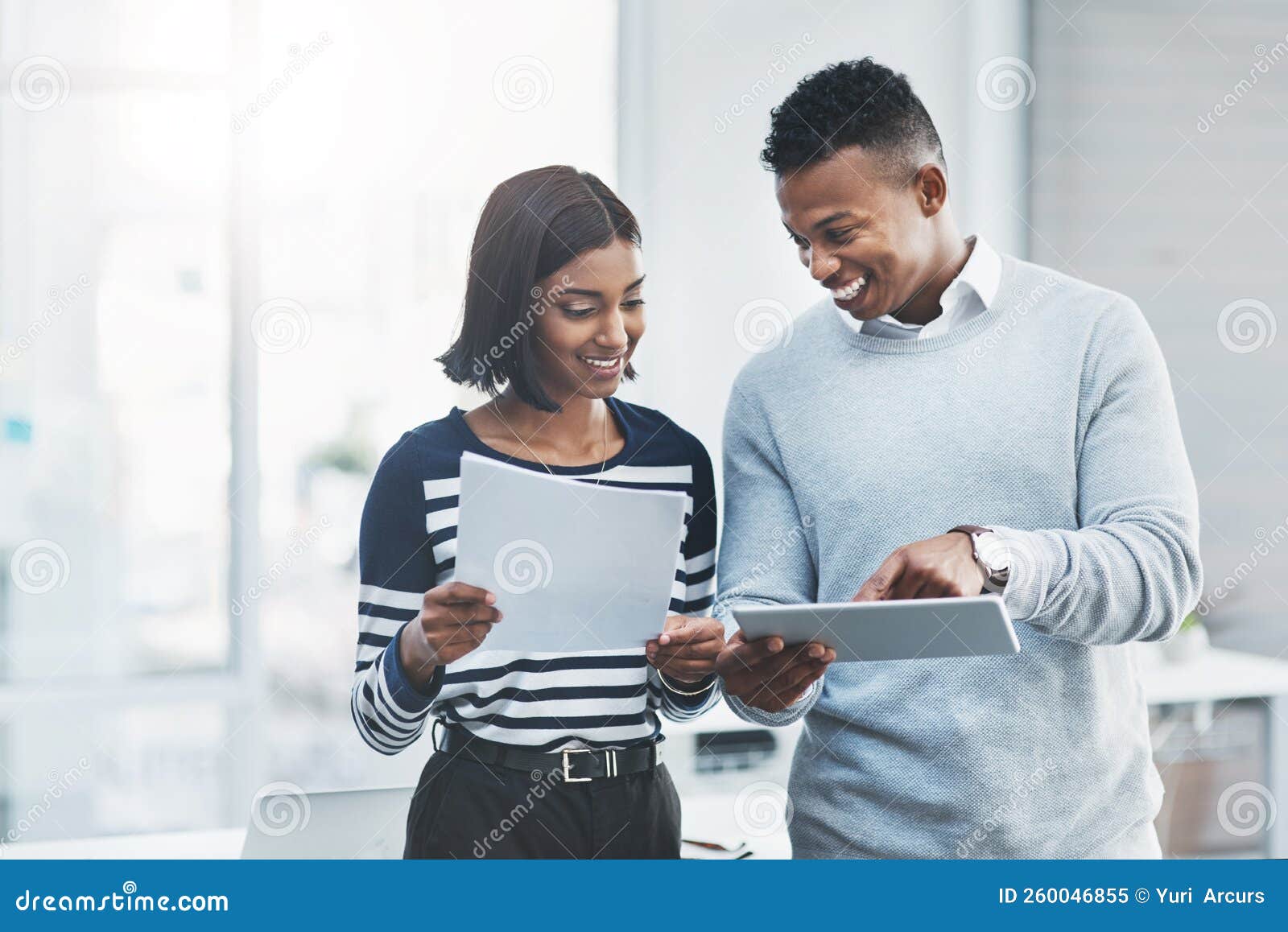 Teamwork Clearly Makes the Dream Work. Two Young Businesspeople ...