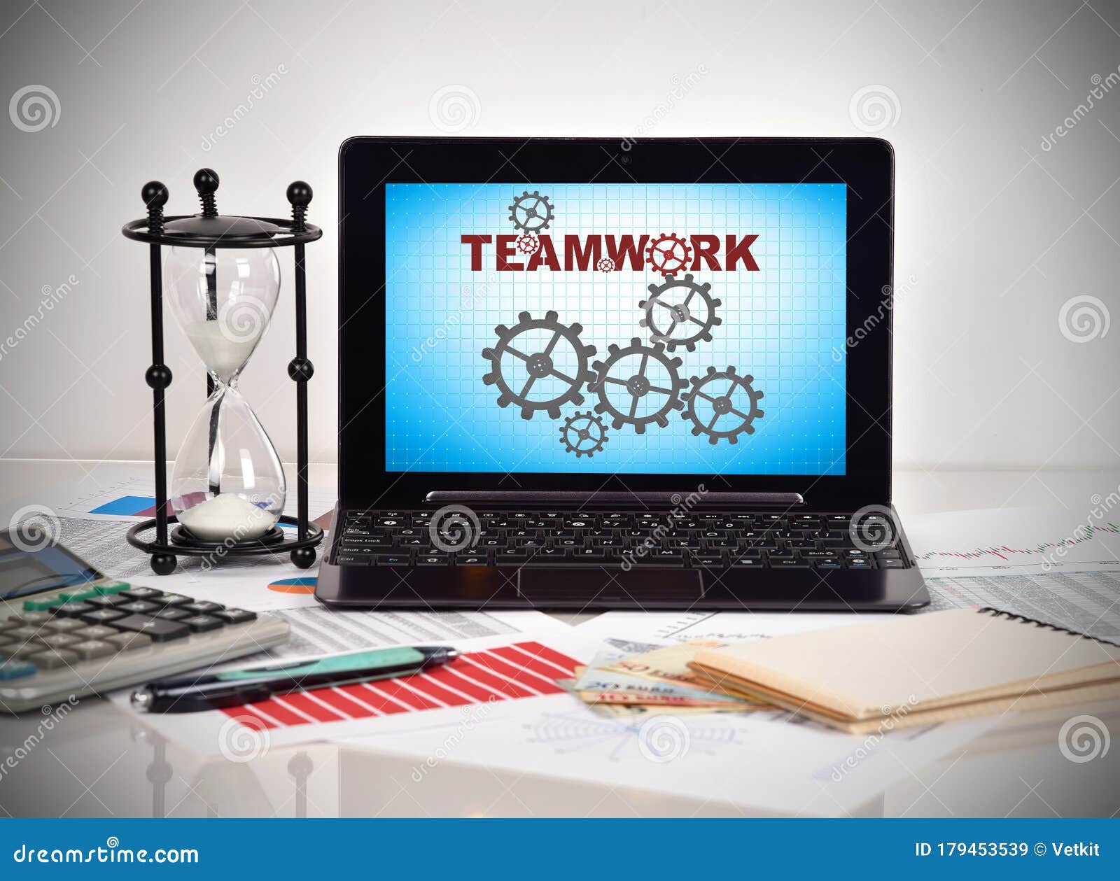 Teamwork with Cogs on Screen Notebook Stock Image - Image of ...