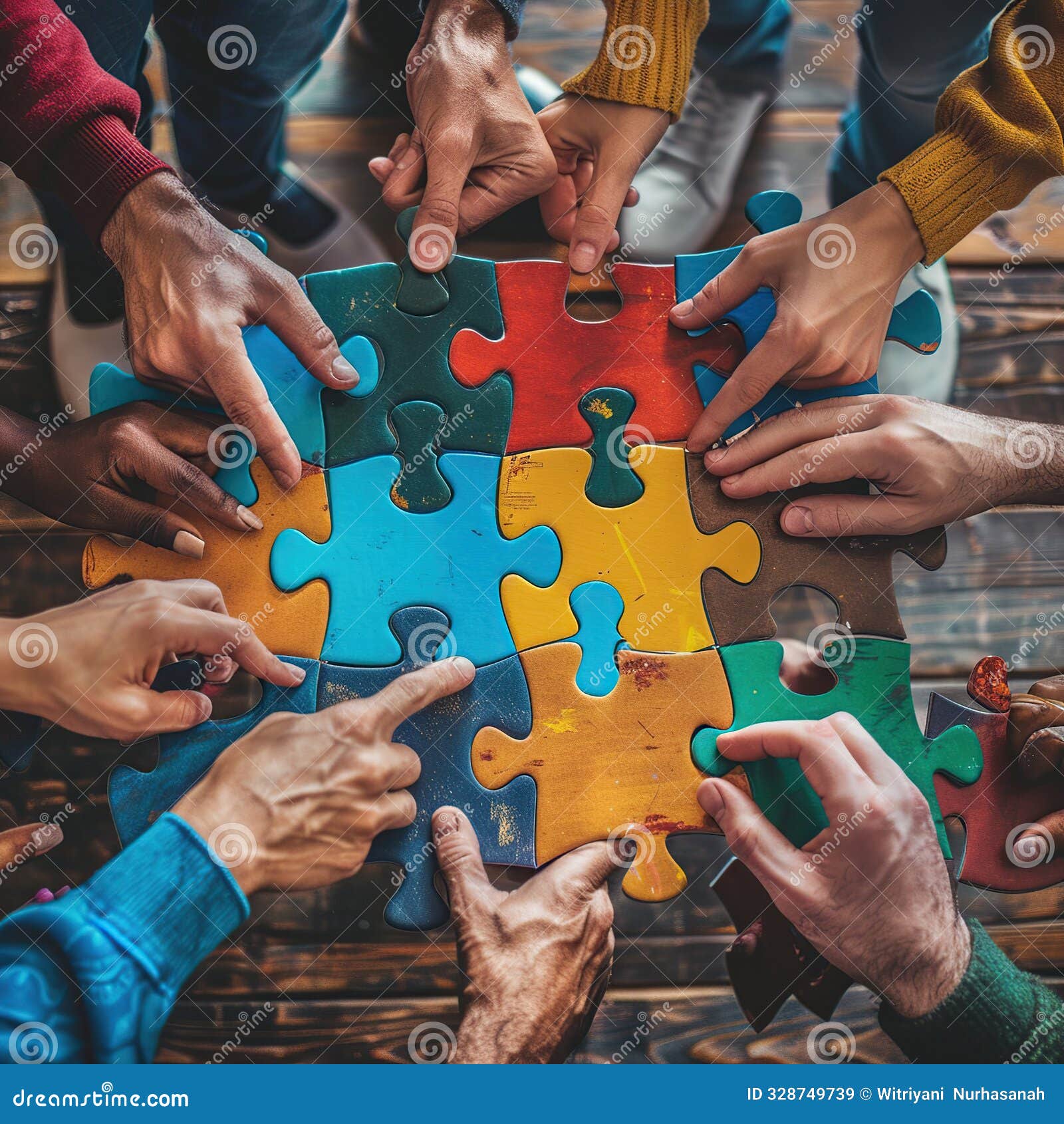 Teamwork and Collaboration: Hands Assembling Jigsaw Puzzle Stock ...