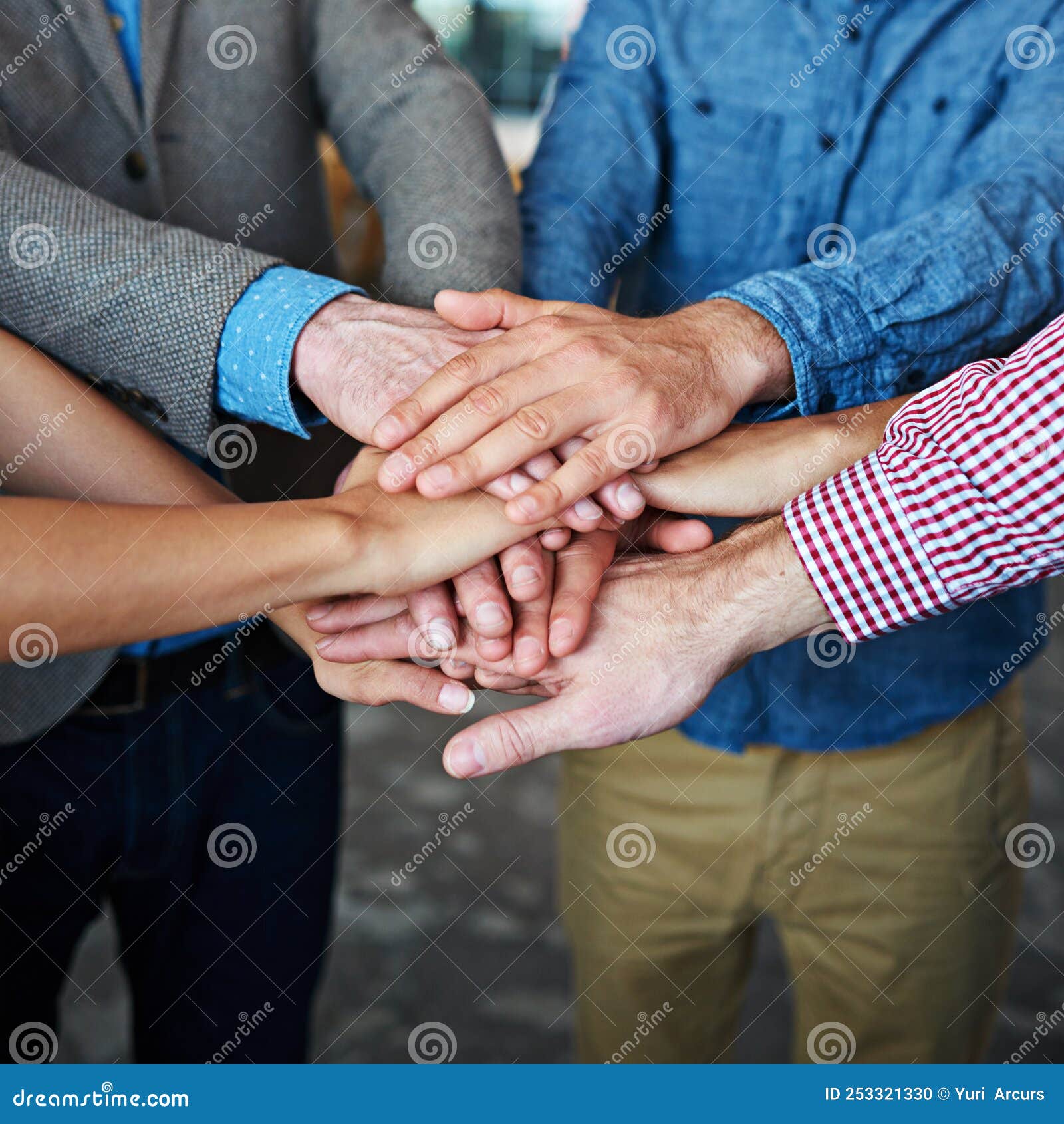 Teamwork, Collaboration and Support while Putting Hands Together in an ...