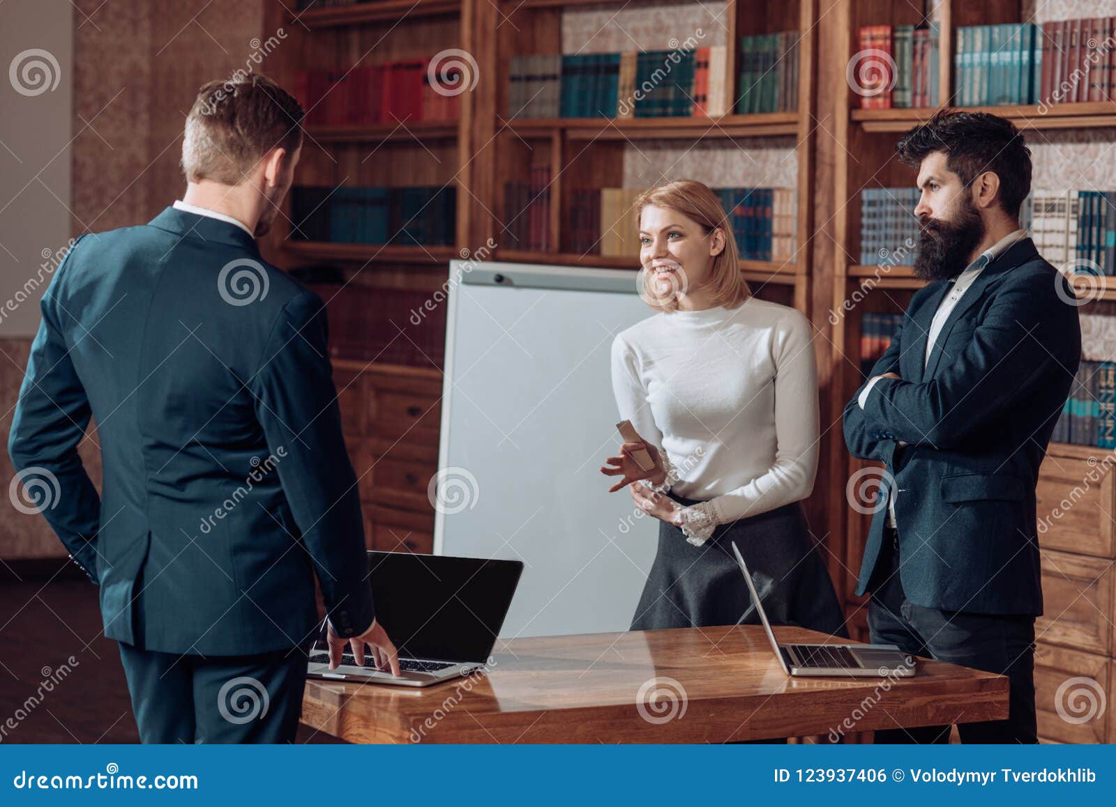 Teamwork Concept. Group Of Students Training Teamwork Skills In Library ...