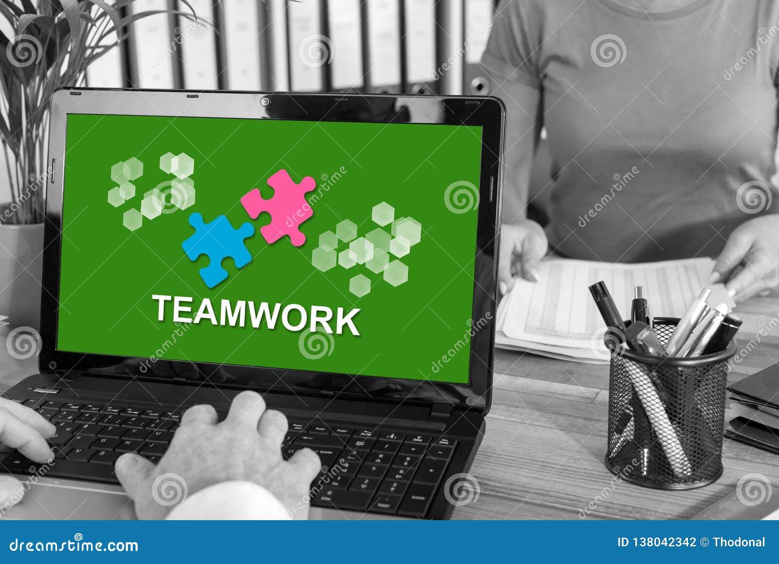 Teamwork Concept on a Laptop Stock Photo - Image of jigsaw, team: 138042342