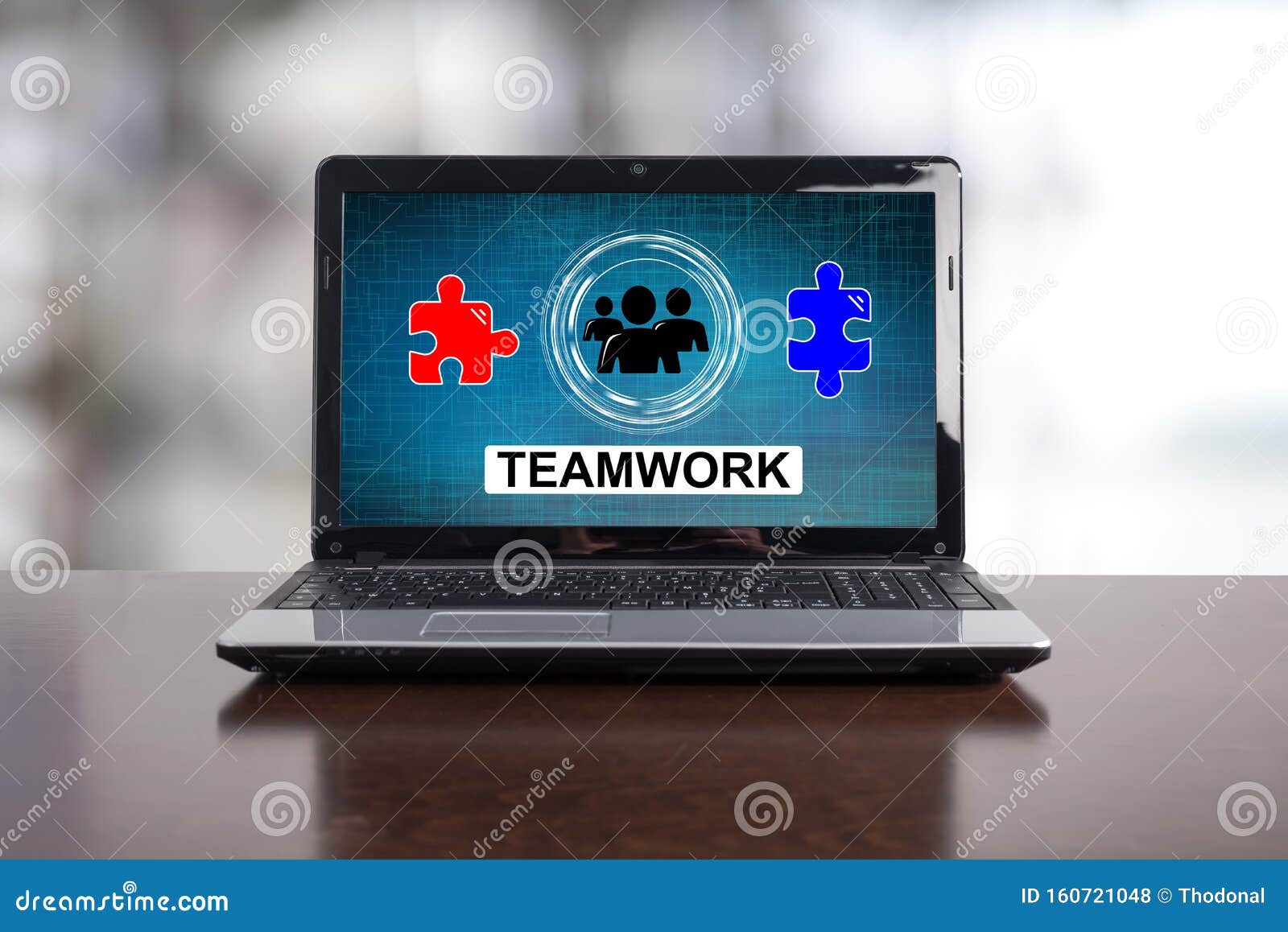 Teamwork Concept on a Laptop Stock Photo - Image of puzzle, business ...