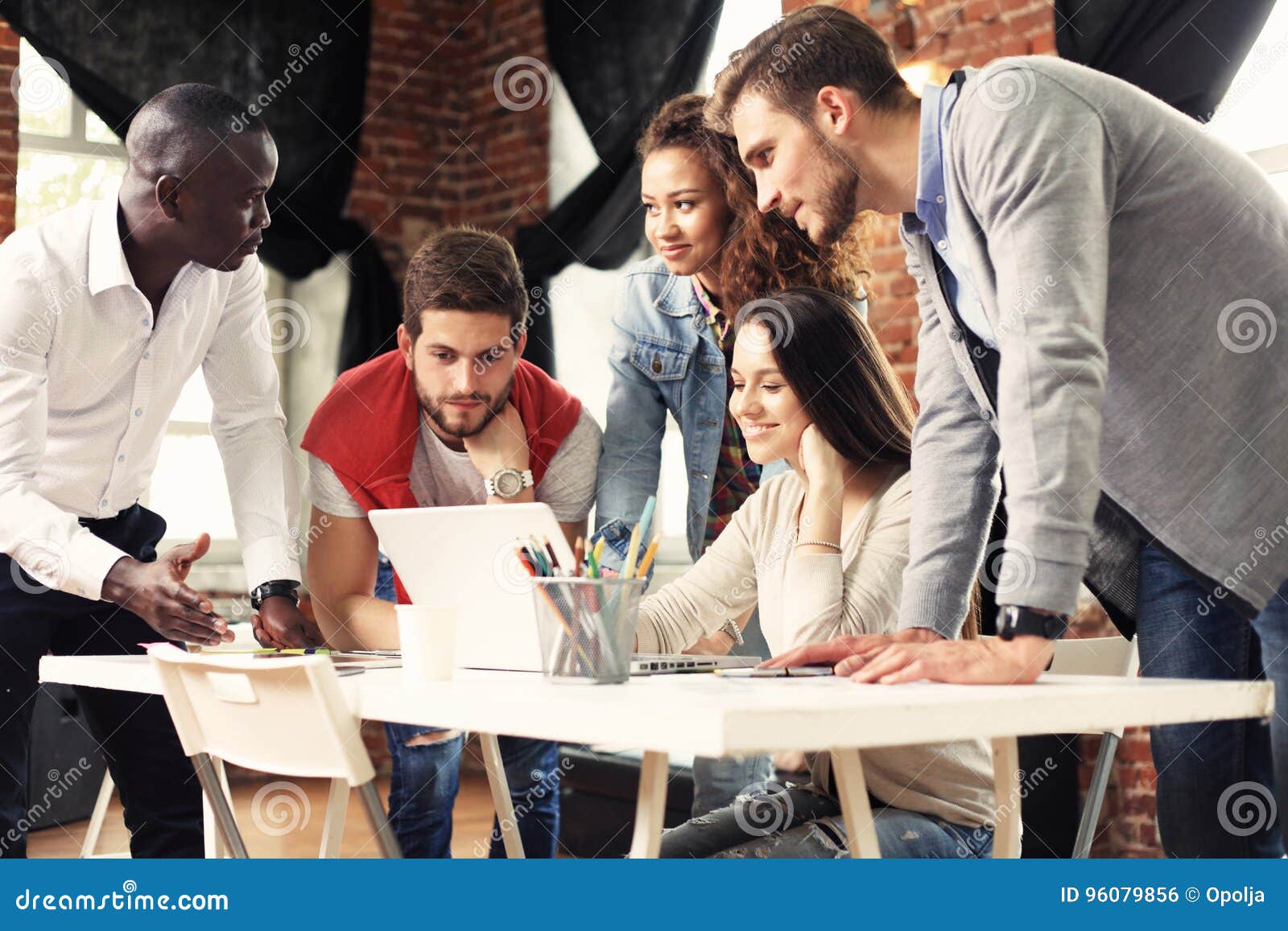 Teamwork Concept.Young Creative Coworkers Working with New Startup ...