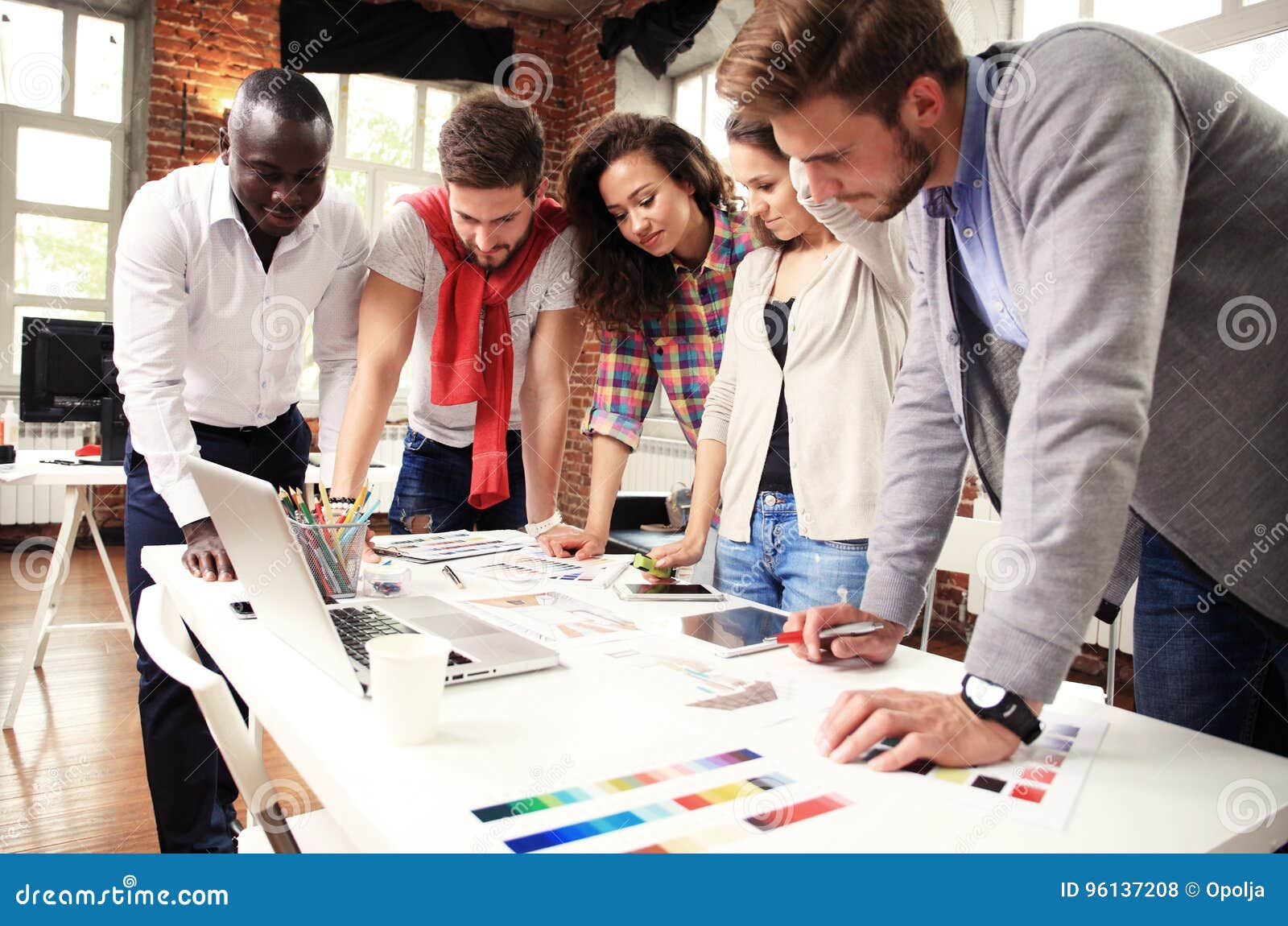 Teamwork Concept.Young Creative Coworkers Working with New Startup ...