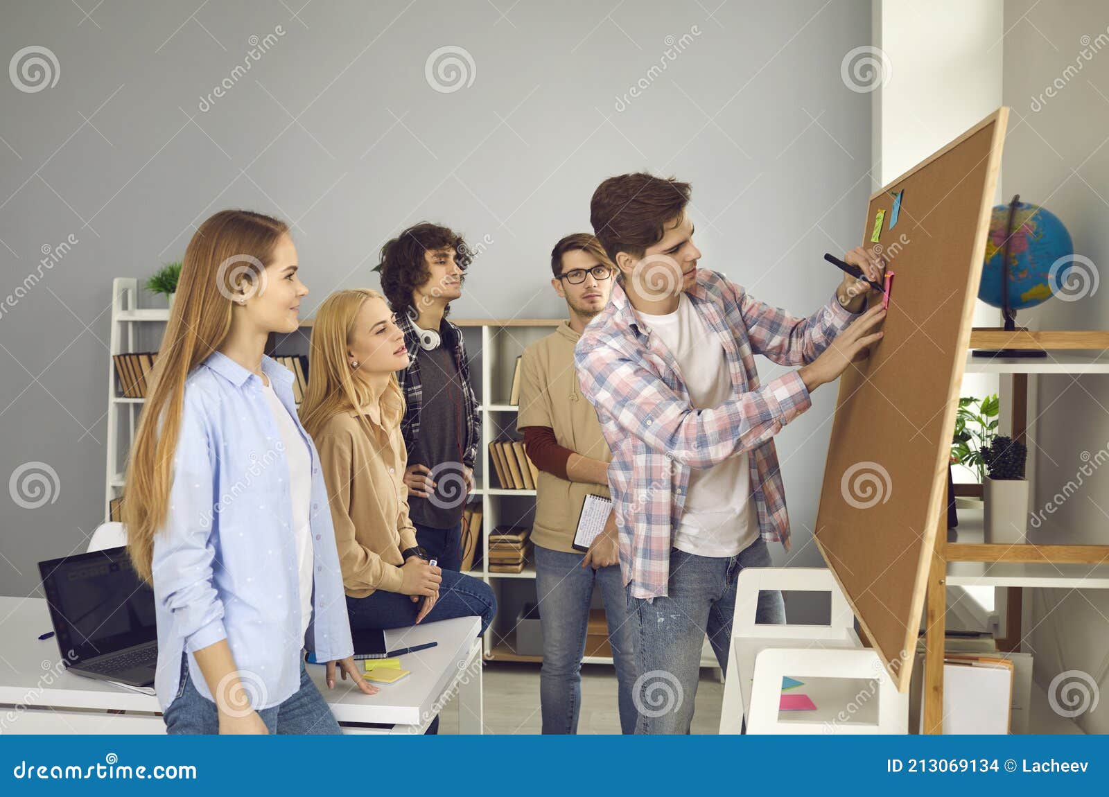 College Students Working on Team Assignment and Brainstorming in Search ...