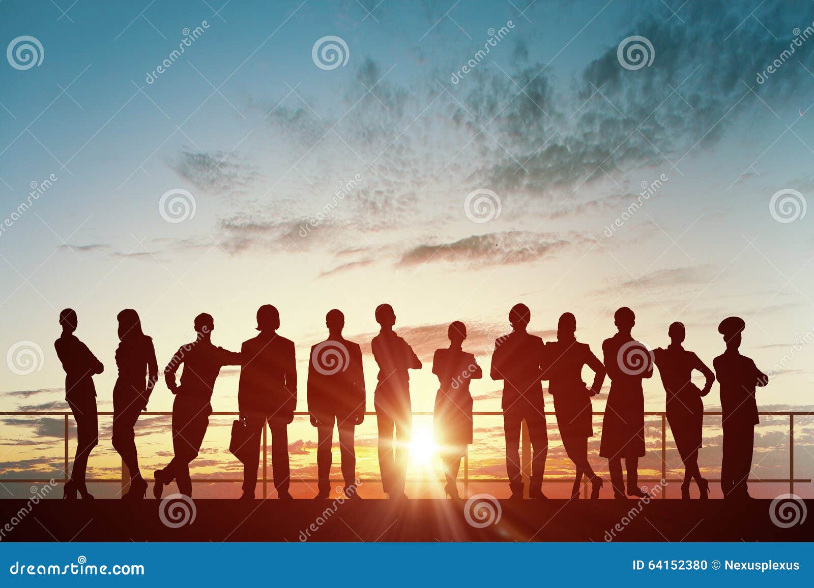 Teamwork on Dawn Background Stock Photo - Image of posing, professional ...