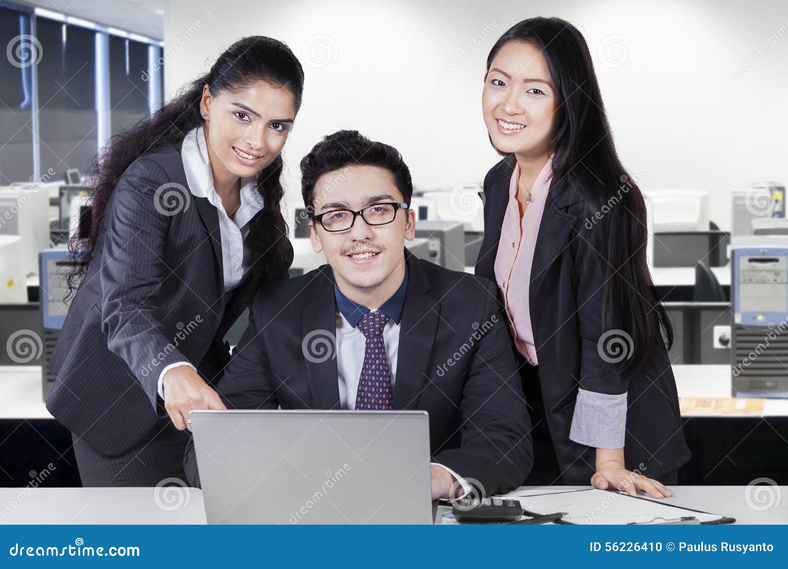 Teamwork Discussing with Laptop at Workplace Stock Photo - Image of ...