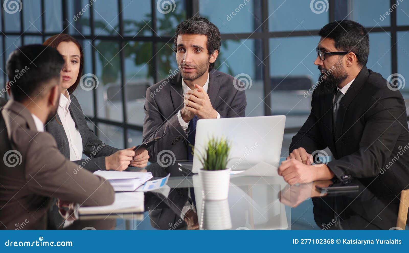 Teamwork - Discussion in the Office. Young and Successful Stock Photo ...