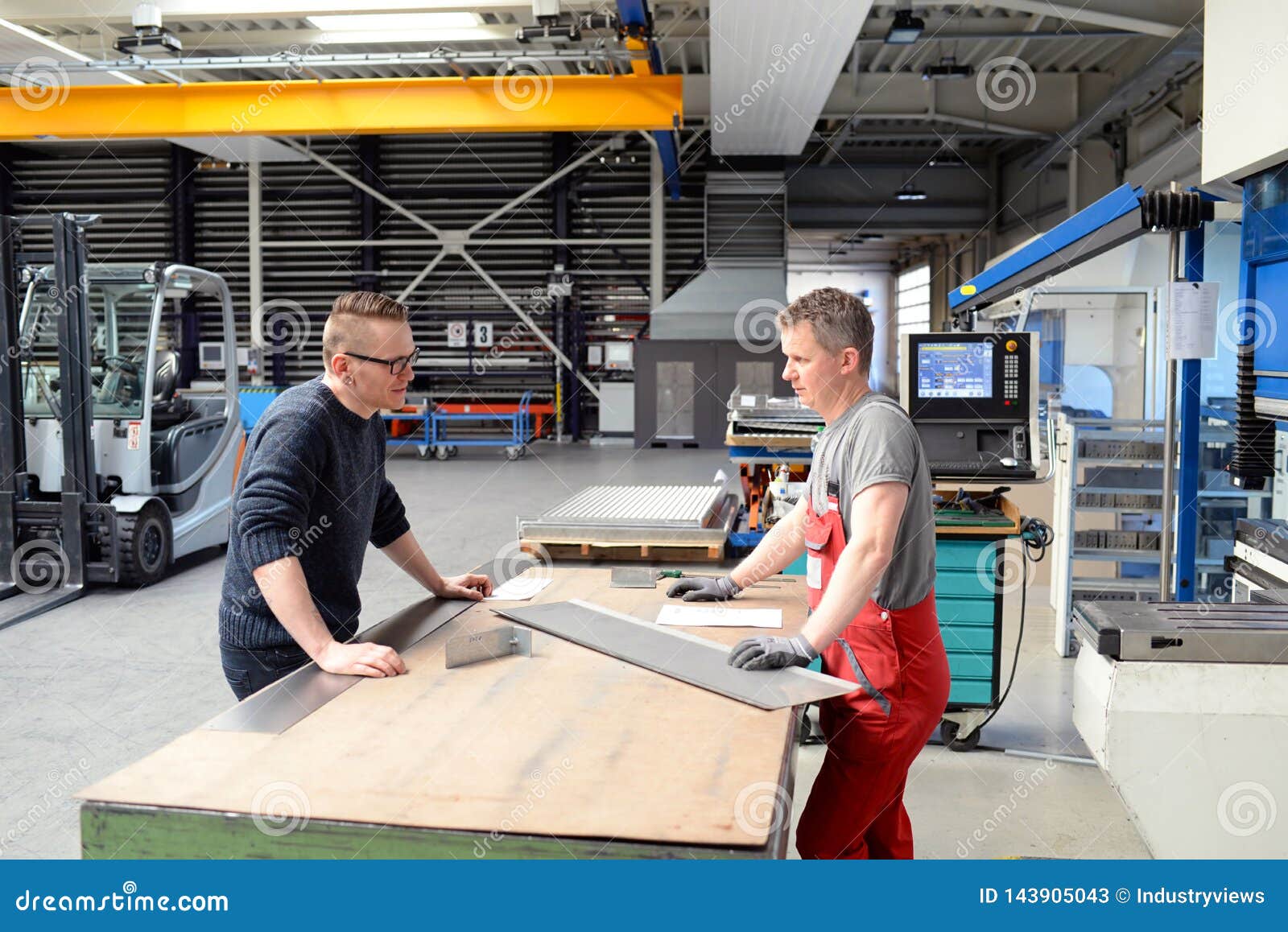 Teamwork Discussion of Workers in the Metal Industry Stock Image ...