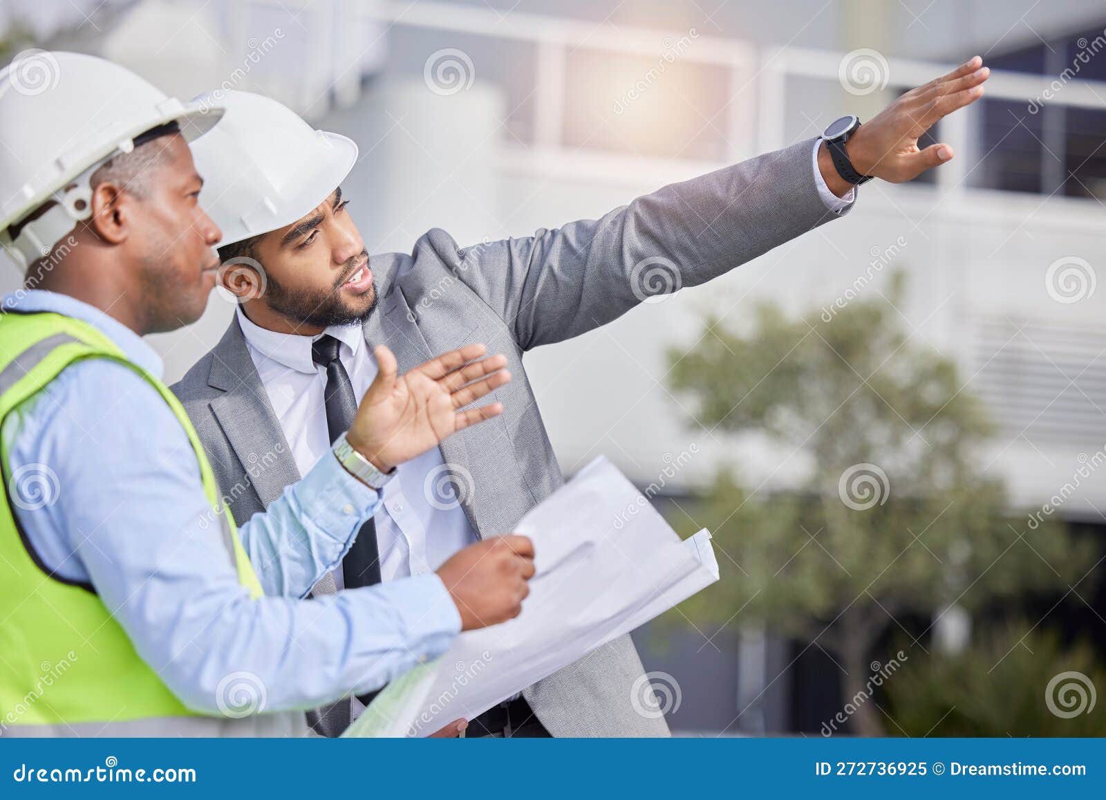 Teamwork, Engineering and Leader with Blueprint at Construction Site ...