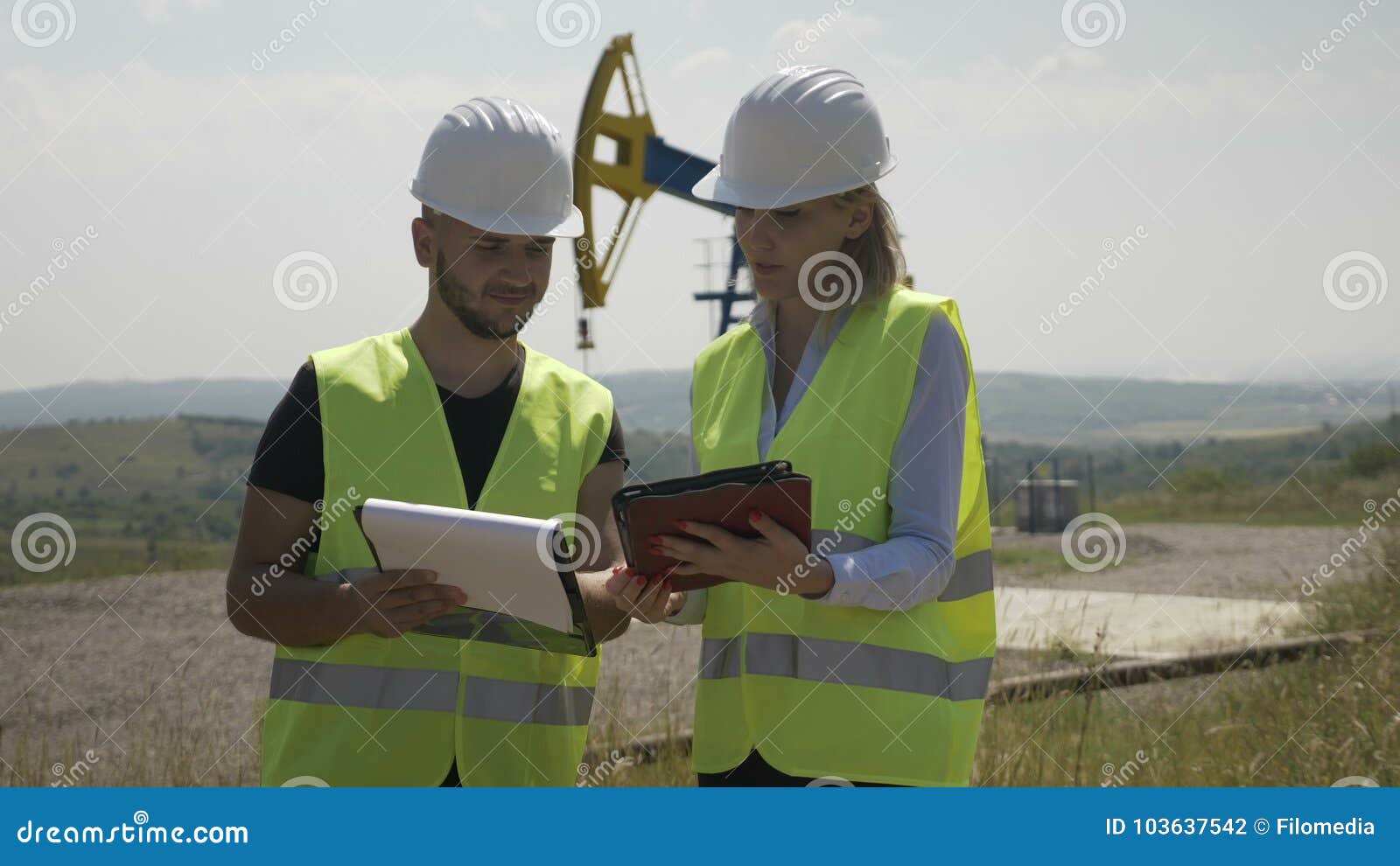 Teamwork of Engineers in Oilfield Industry Analyzing Engineering ...
