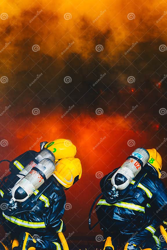 Teamwork of Firefighters Training Stock Photo - Image of orange, flame ...