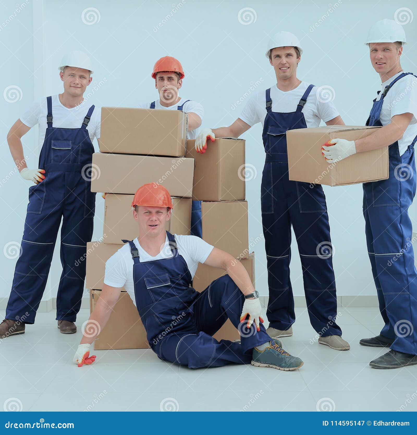 Foreman and Team Builders with Boxes Stock Image - Image of portrait ...