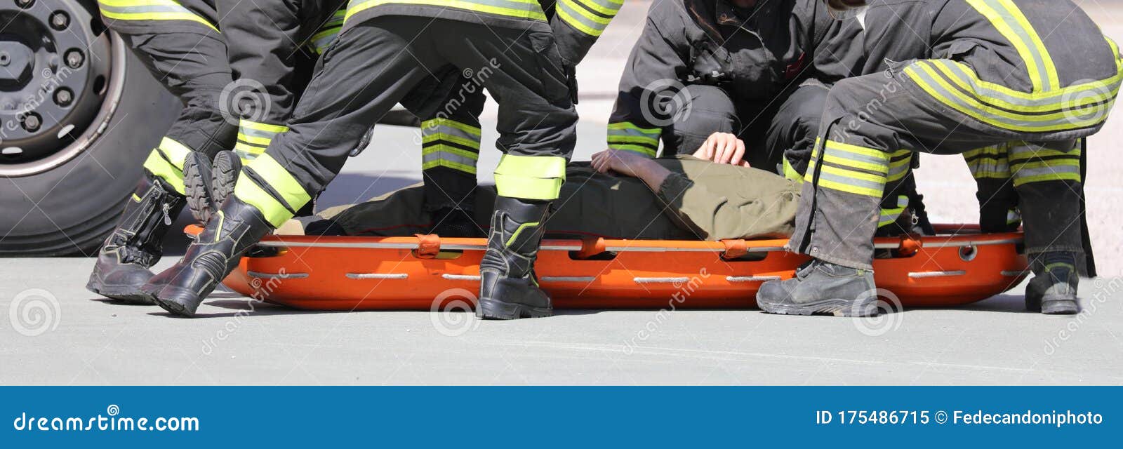Teamwork of Four Firefighters and a Stretcher Stock Image - Image of ...