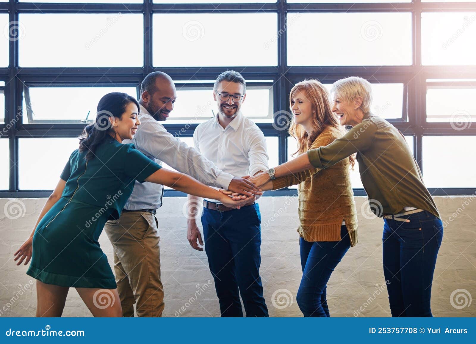 Teamwork, Fun and Collaboration by Diverse Team Joining Hands in Team ...