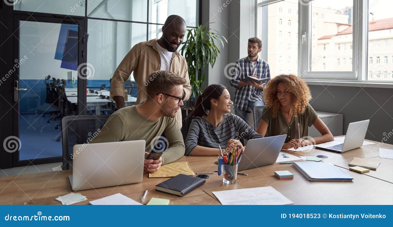 Teamwork. Group of Young Happy Multicultural Business People Working ...
