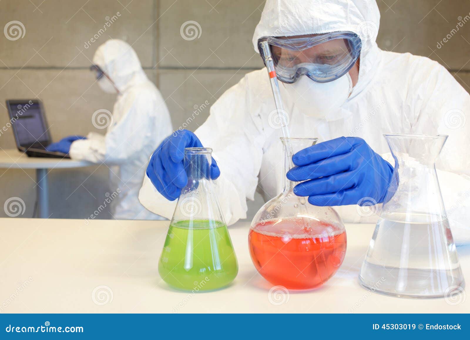 Teamwork in laboratory stock image. Image of laptop, chemistry - 45303019