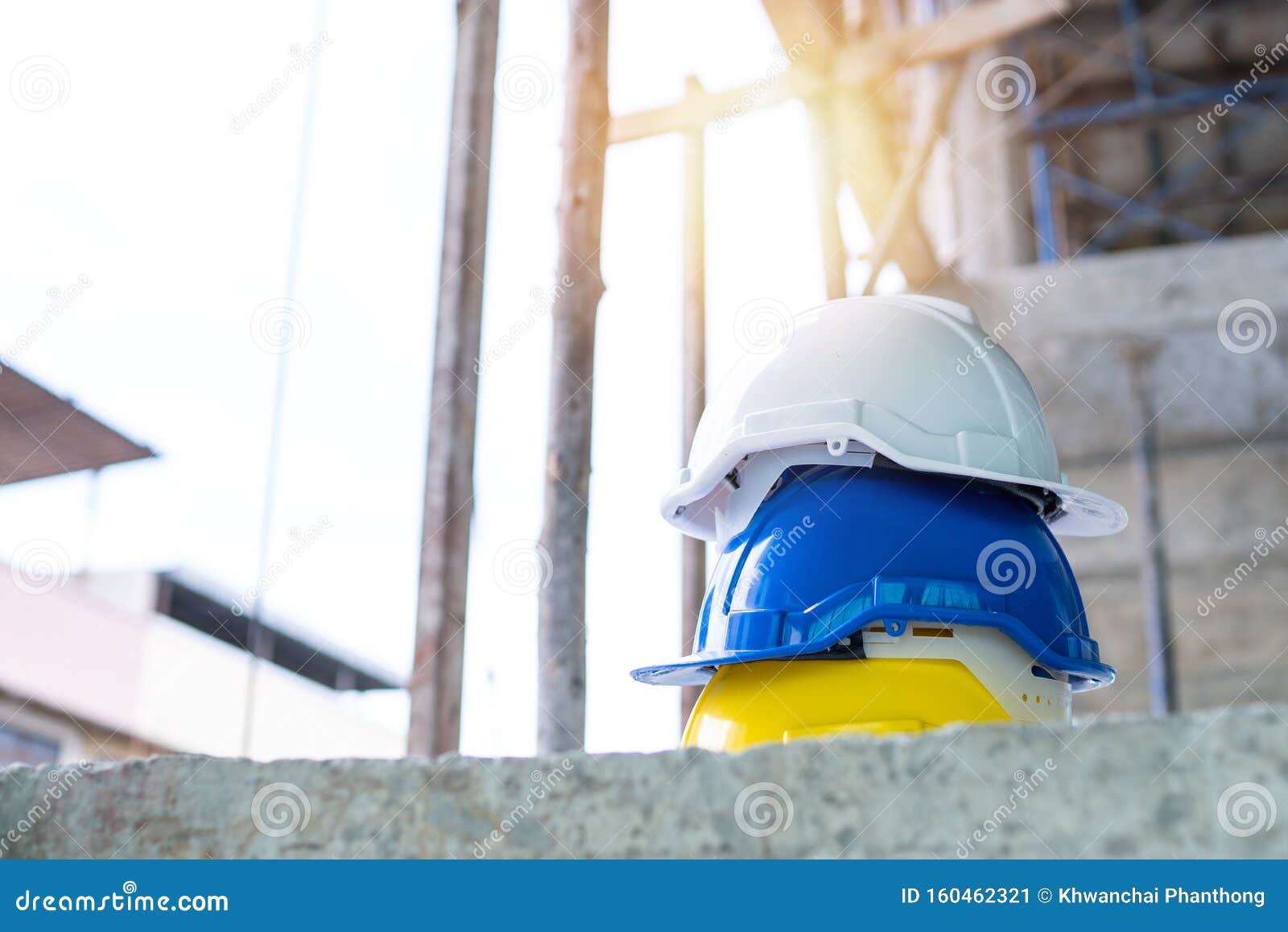 Teamwork and Leadership Concept, Safety White, Blue and Yellow Helmet ...