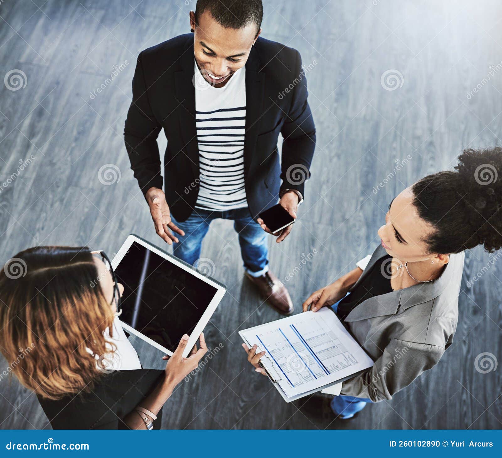 Teamwork Makes All the Difference. High Angle Shot of a Group of ...