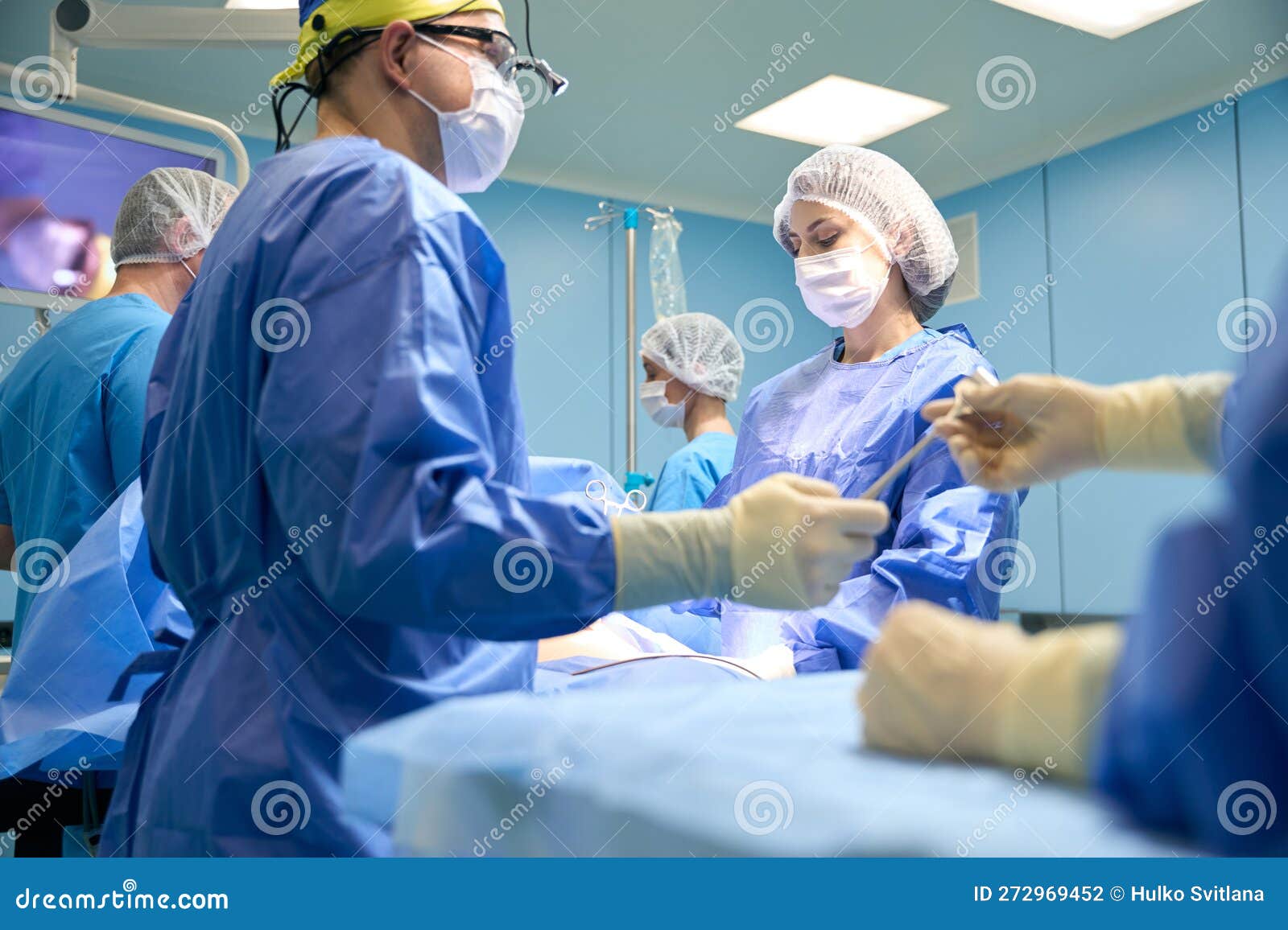 Teamwork of the Operating Team at the Surgical Table Stock Photo ...