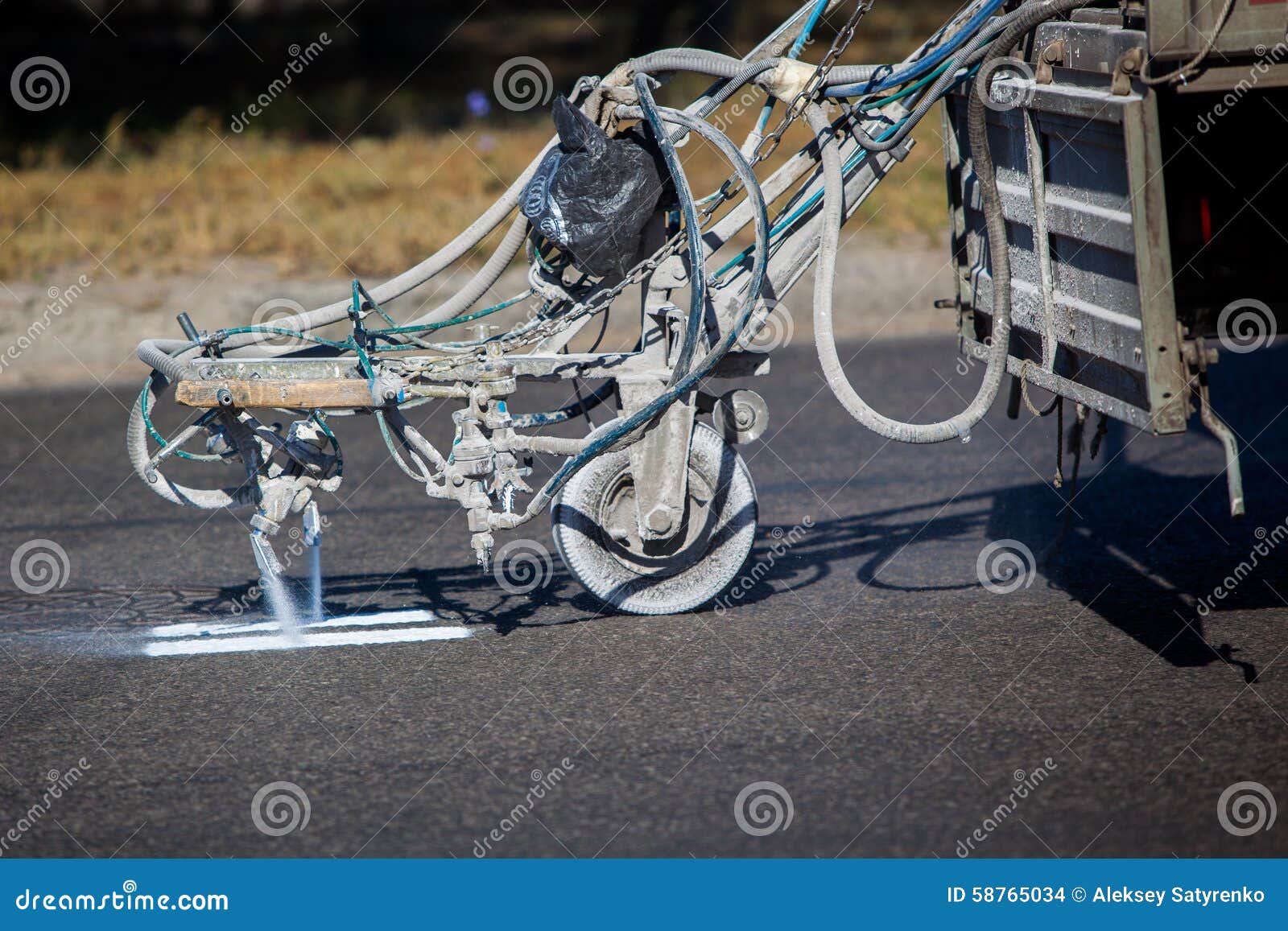Teamwork: Pavement Asphalt Road Marking Paint and Stock Photo - Image ...