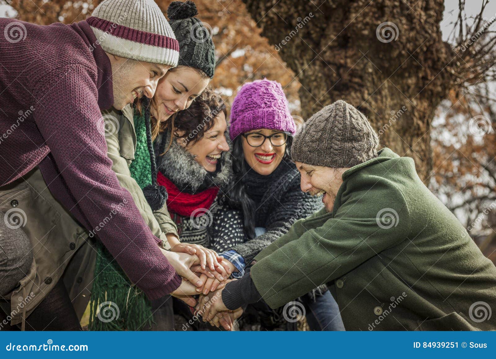 Teamwork Playing and Joining Hands at the Park. Autumn Stock Image ...