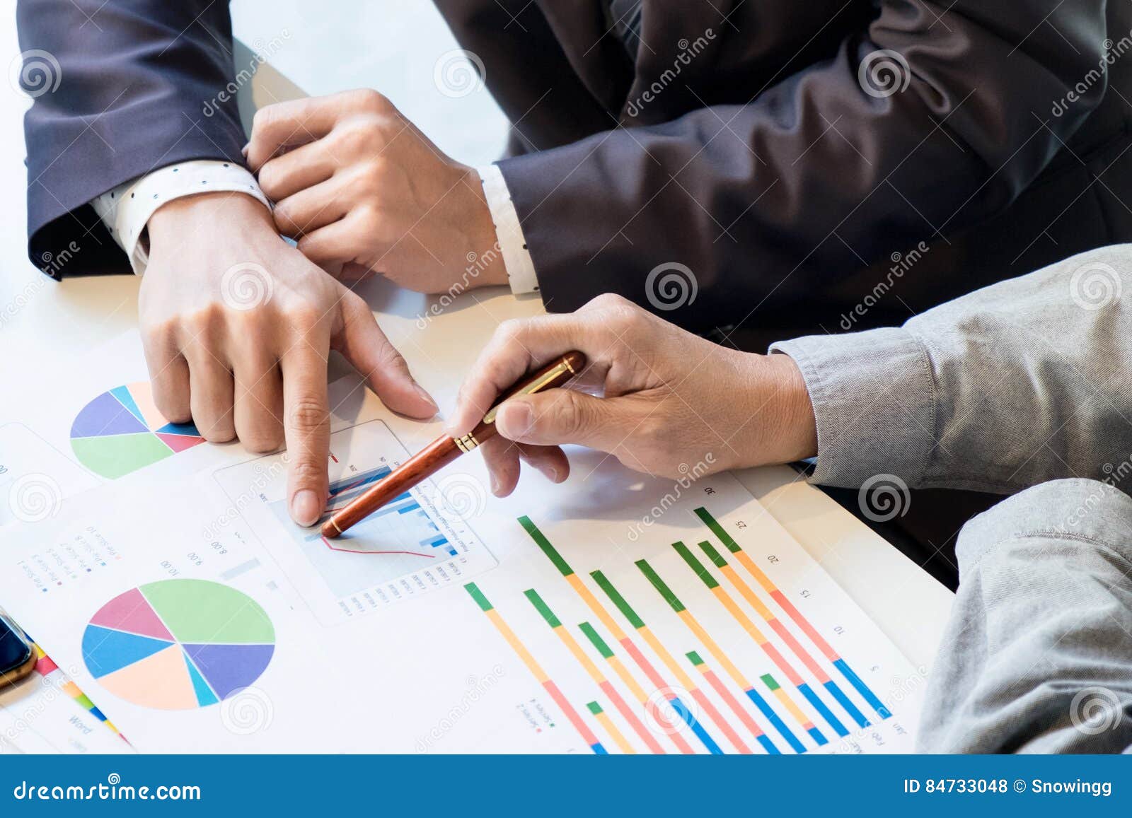 Teamwork Process. Young Business Managers Crew Working with New Stock ...