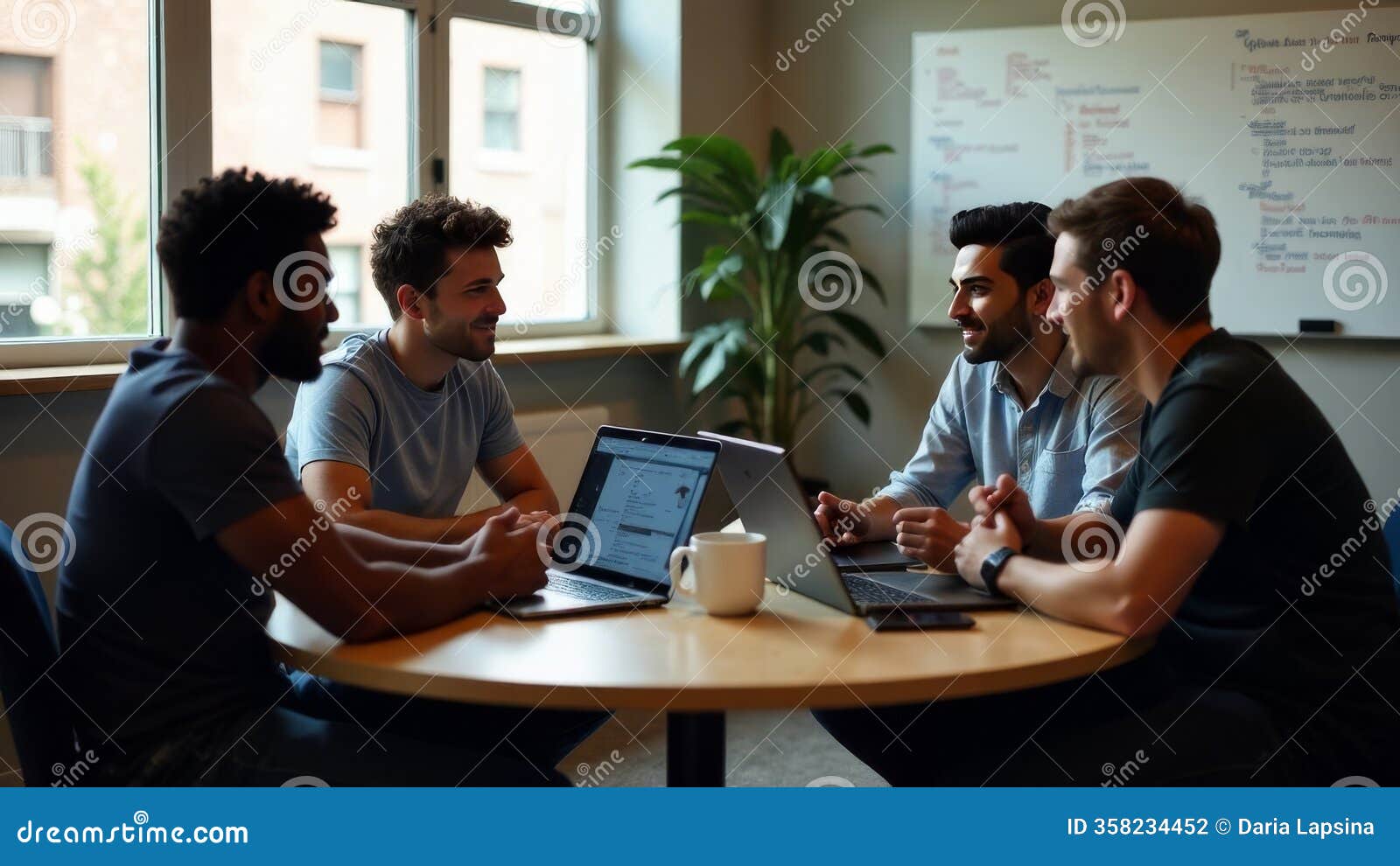 Teamwork of Programmers in Office. Group of People Sitting at the Round ...