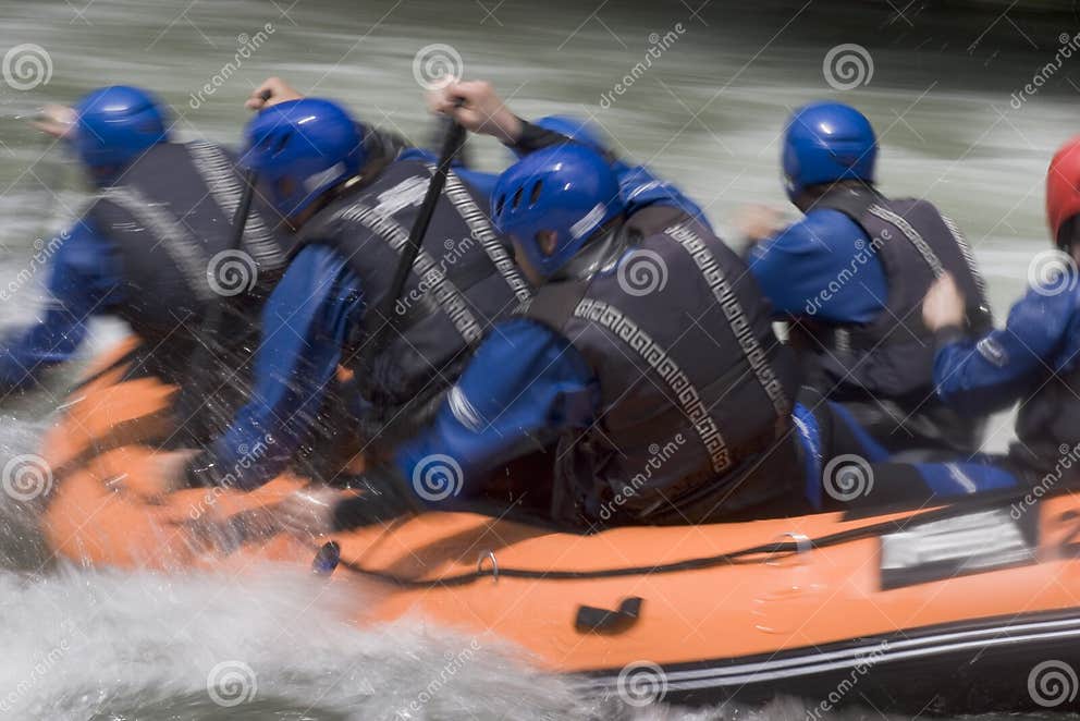 Teamwork in a rafting boat stock photo. Image of action - 2612268