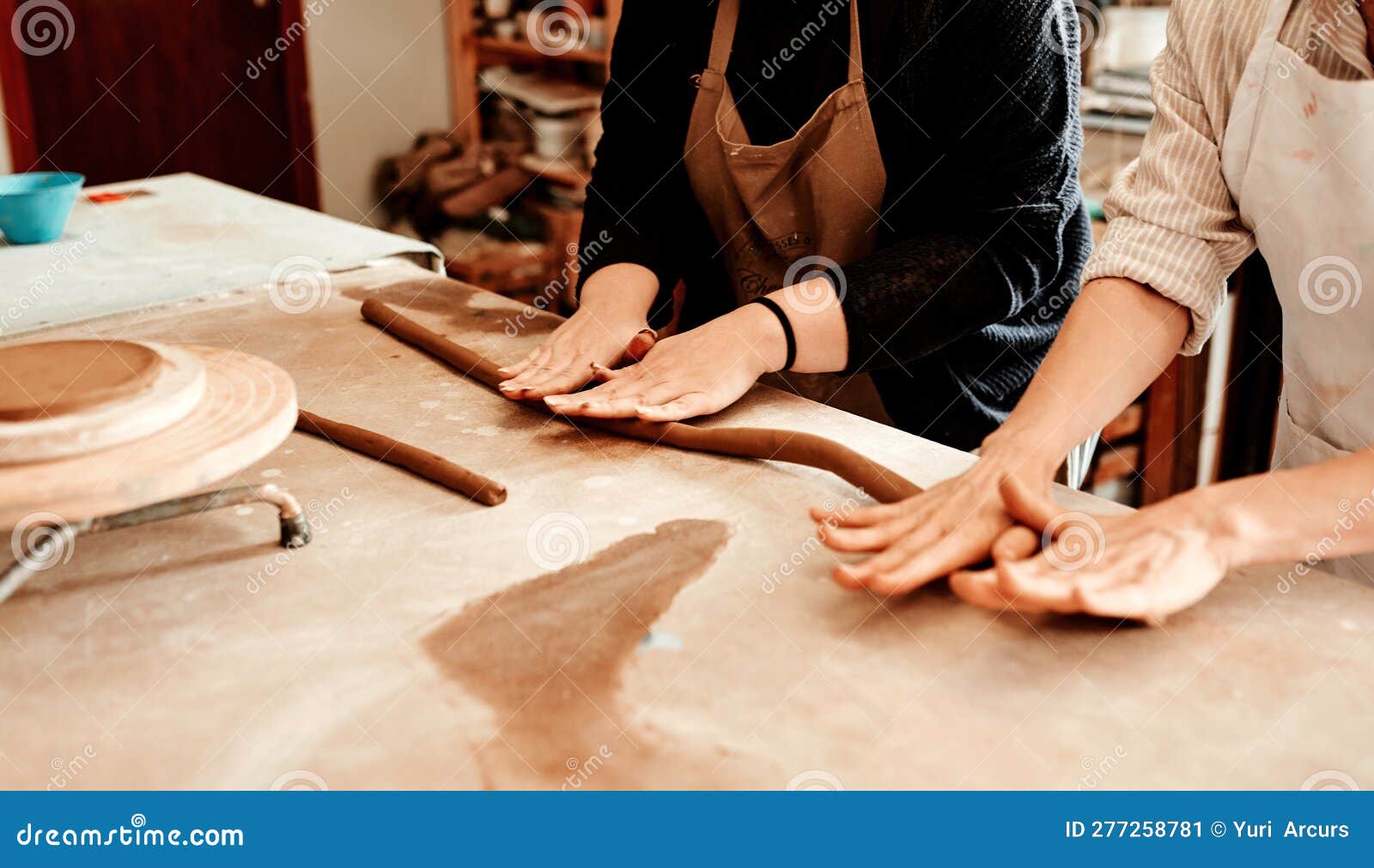 Teamwork is always the Secret Ingredient. Two Artisans Working Together ...