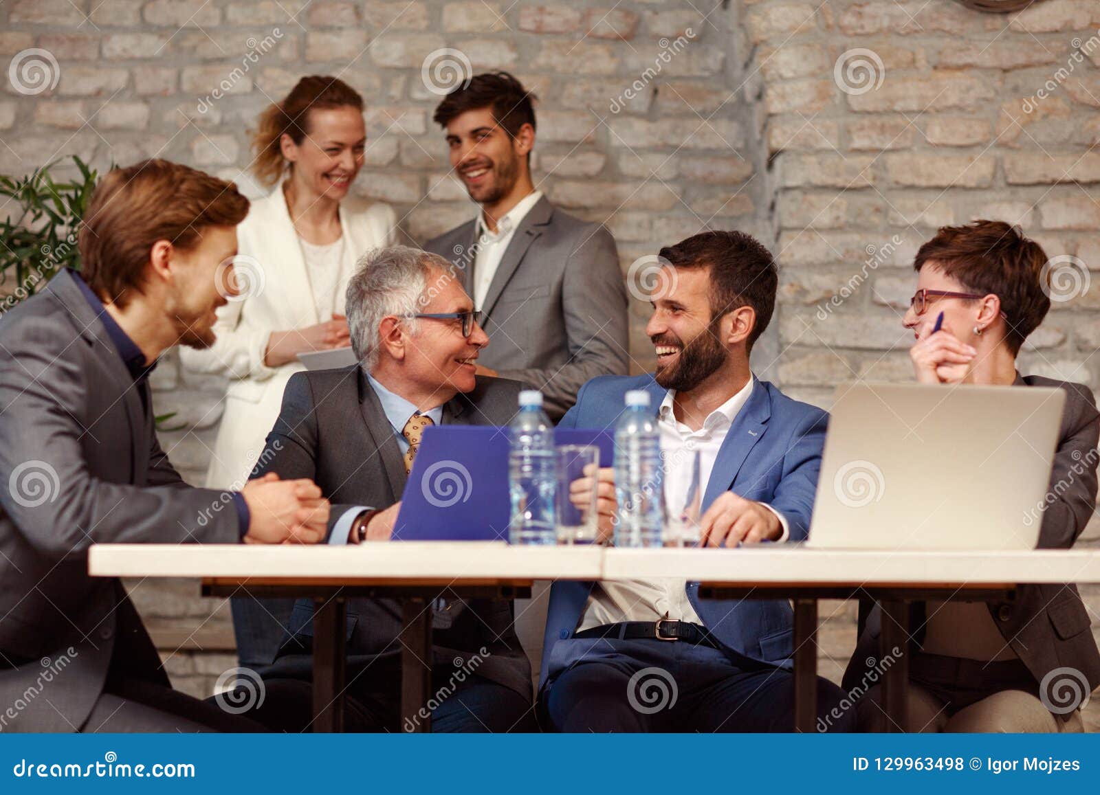 Teamwork of Smiling Business People on Meeting Stock Photo - Image of ...
