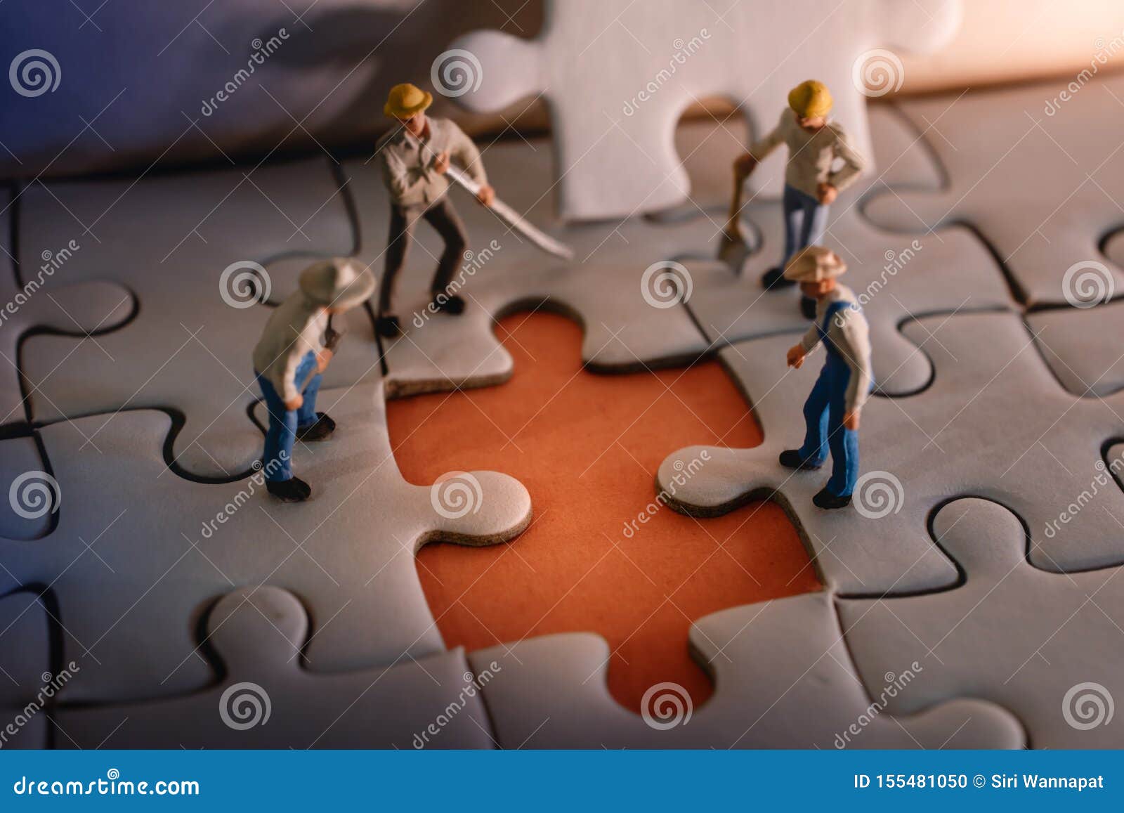 Teamwork And Solving Problem Concept. Group Of Miniature Worker Men ...