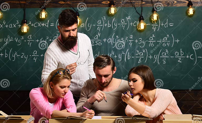 Teamwork. Teamwork of Students Working Together in School Classroom ...