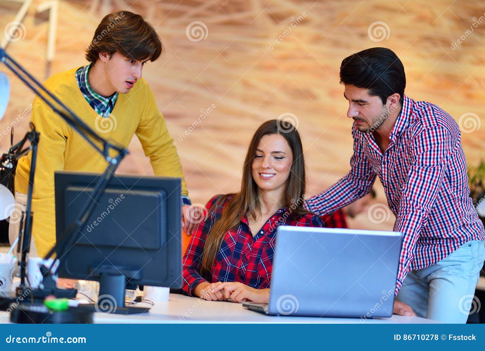 Teamwork. Three Young Architects Working on a Project Stock Photo ...