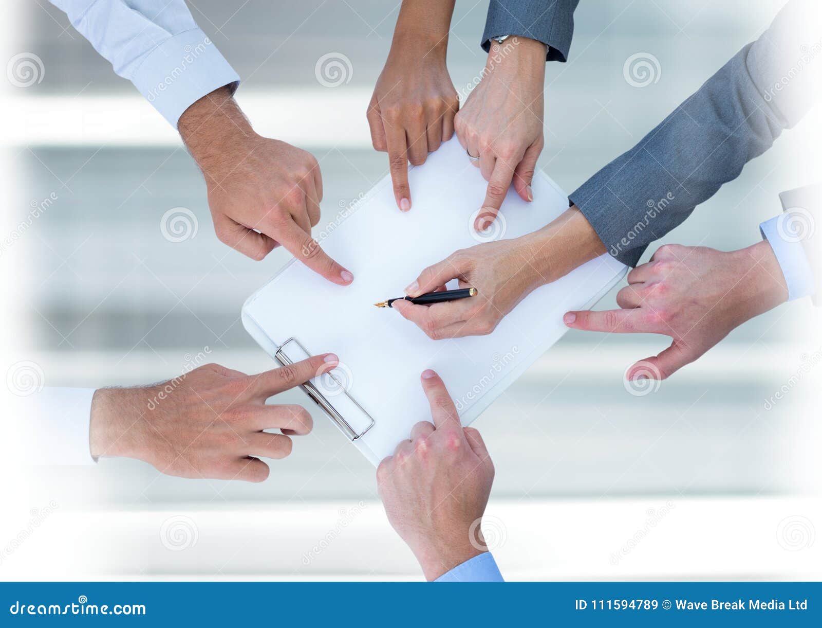 Teamwork Transition with Business Peopleworking and Pointing at ...