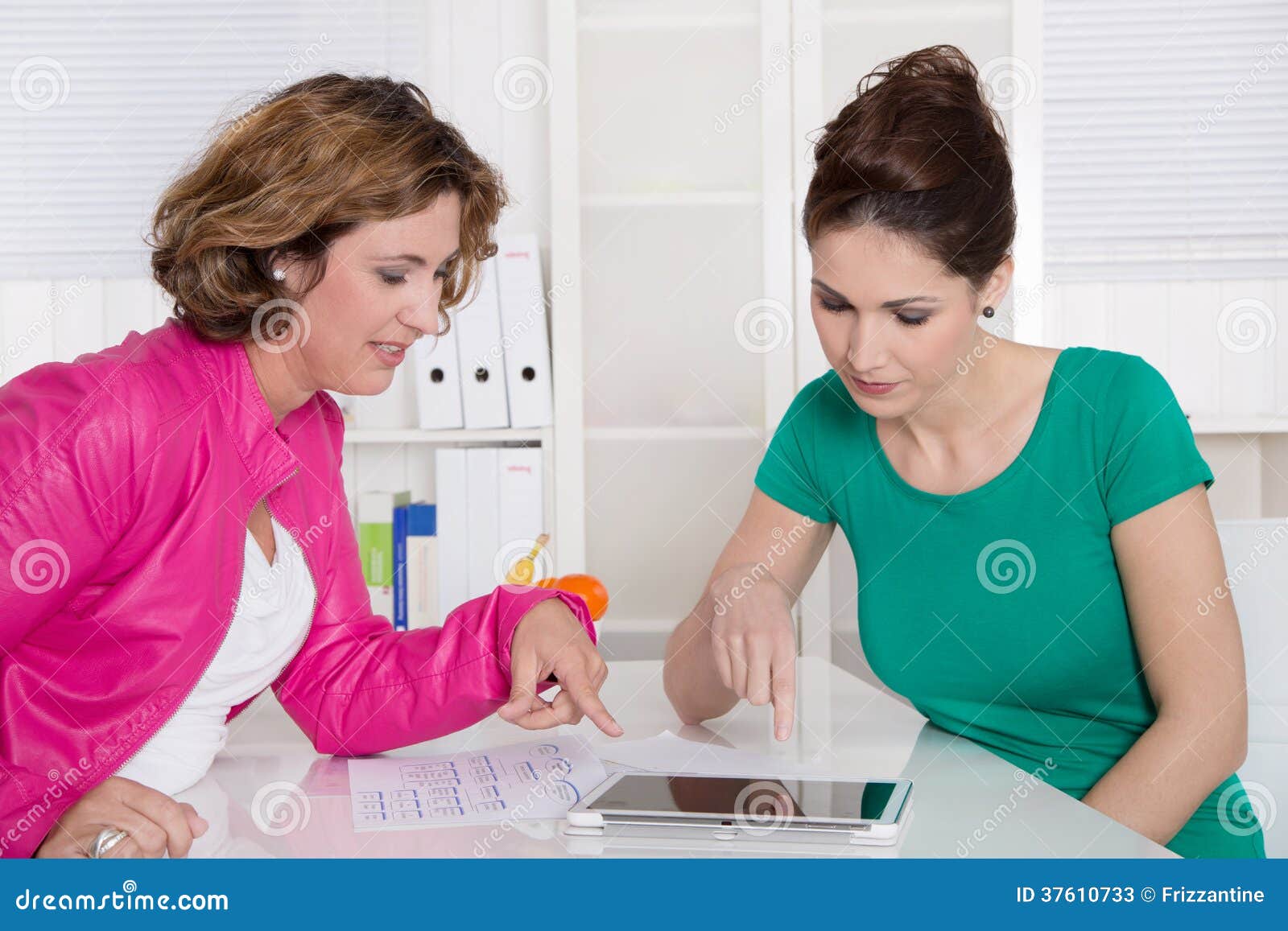 Teamwork: Two Colleagues Working Together with Tab Stock Image - Image ...