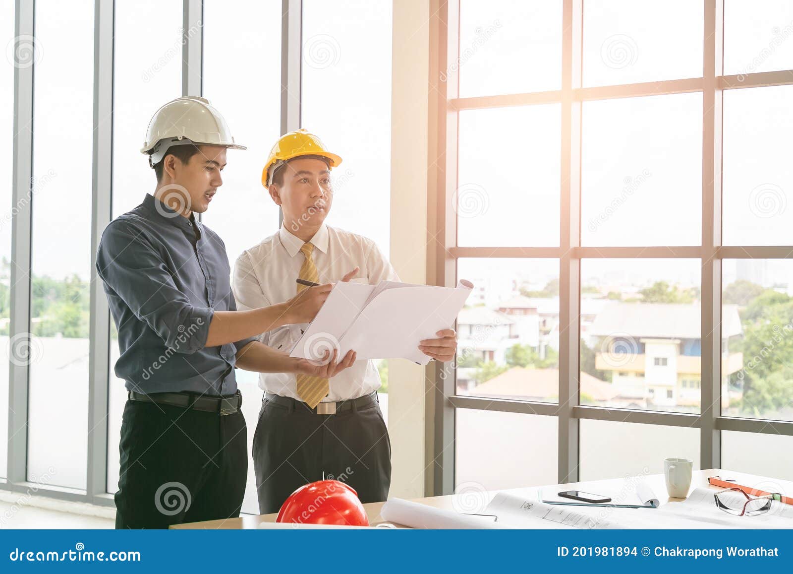Teamwork, Two Engineers Working And Explaining In The Office Stock ...