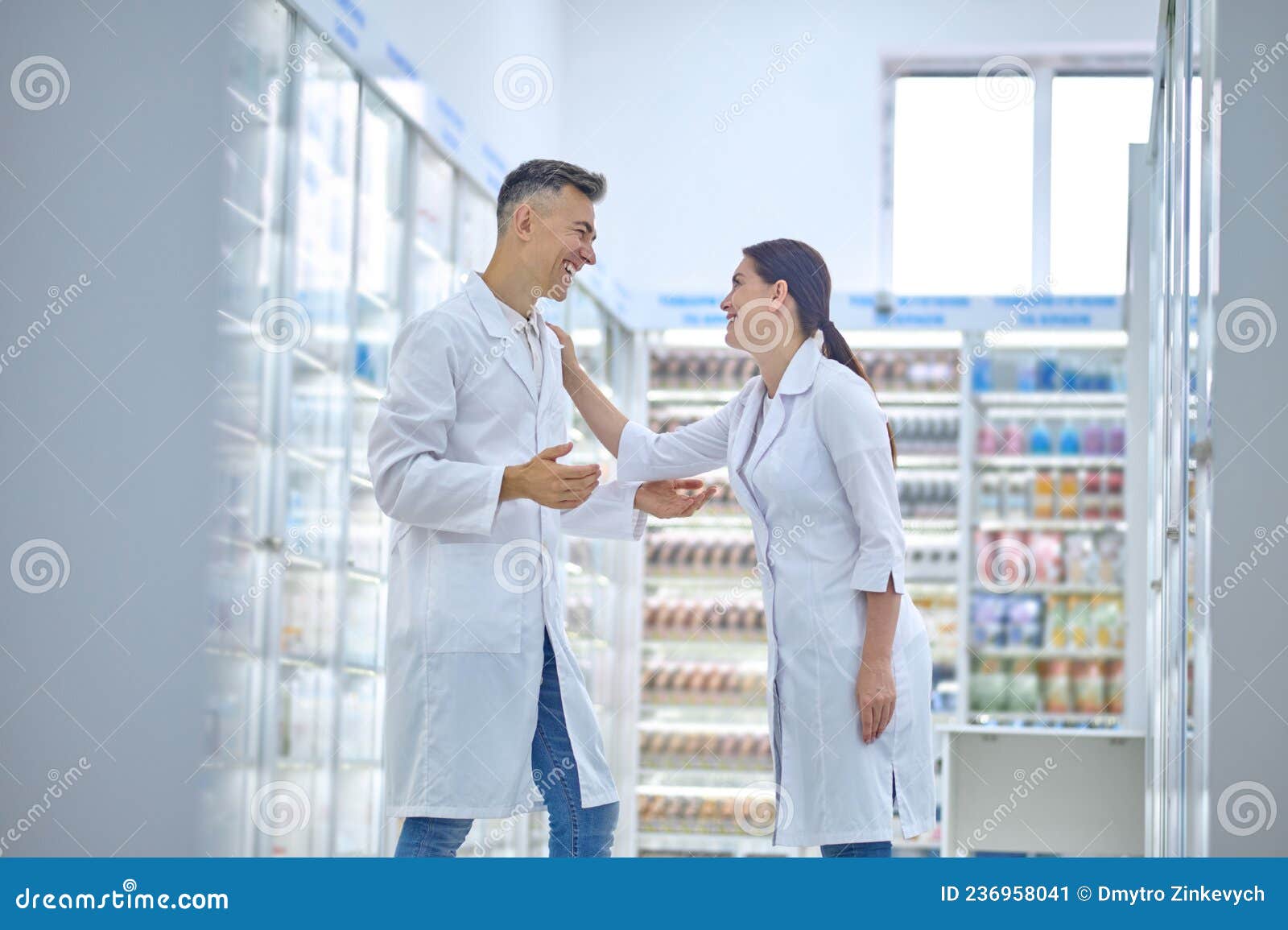Two People in Lab Coats Feeling Good and Smiling Stock Image - Image of ...