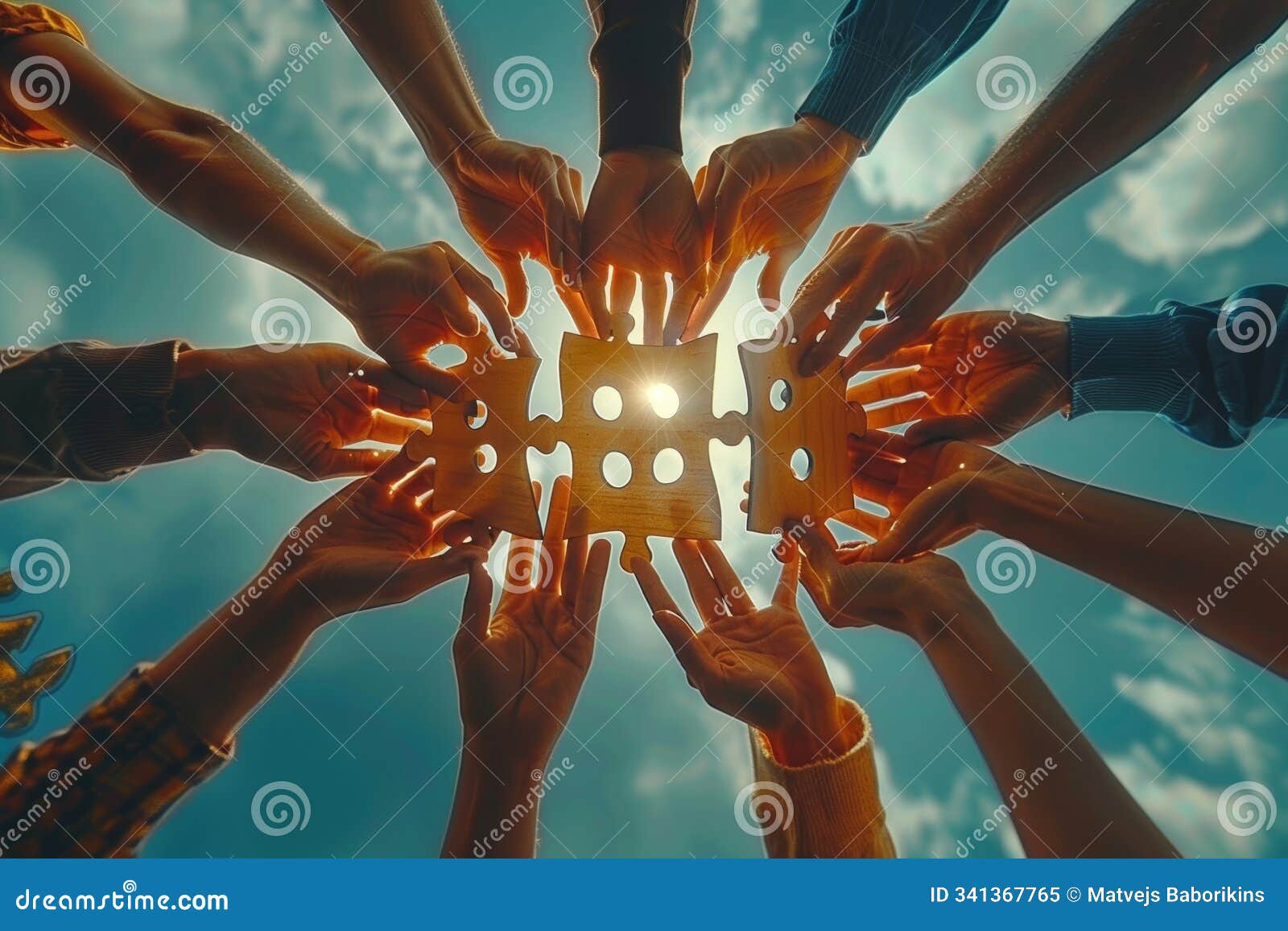 Teamwork and Unity Hands Holding Jigsaw Puzzle Pieces Against a Bright ...