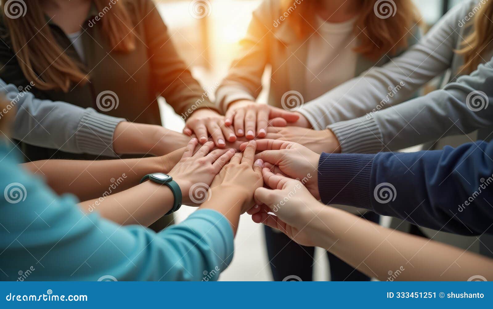 Teamwork and Unity: Hands Stacked Together in a Collaborative Gesture ...