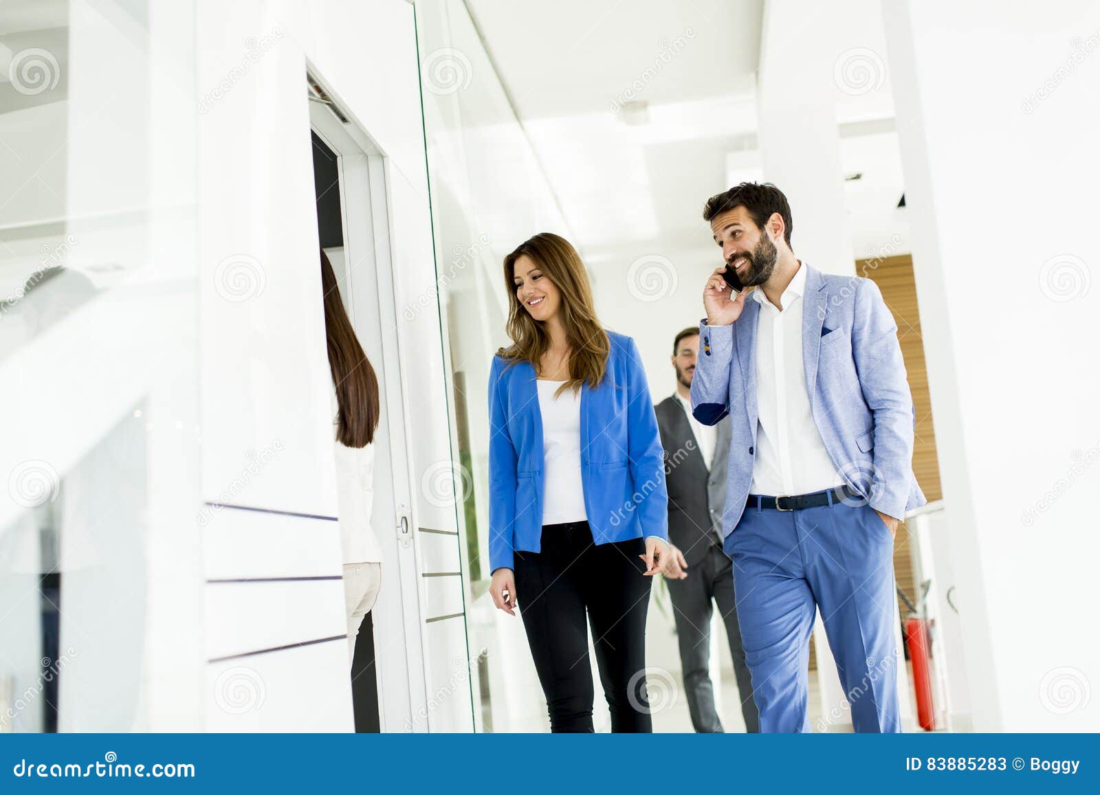 Teamwork Walking in the Office Stock Image - Image of office, teamwork ...