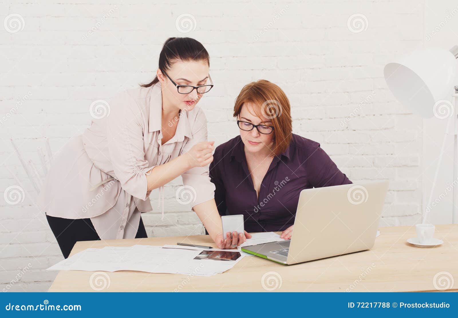 Teamwork. Women Discuss Project in Office Stock Photo - Image of ...
