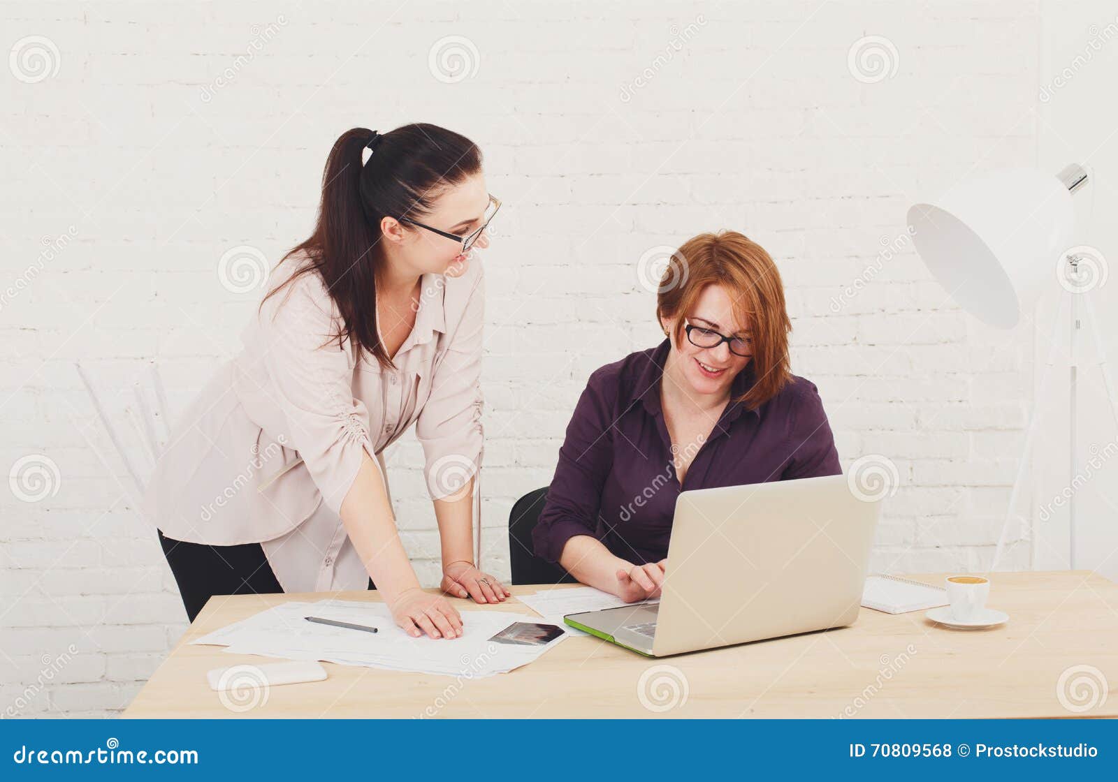 Teamwork. Women Discuss Project in Office Stock Photo - Image of ...