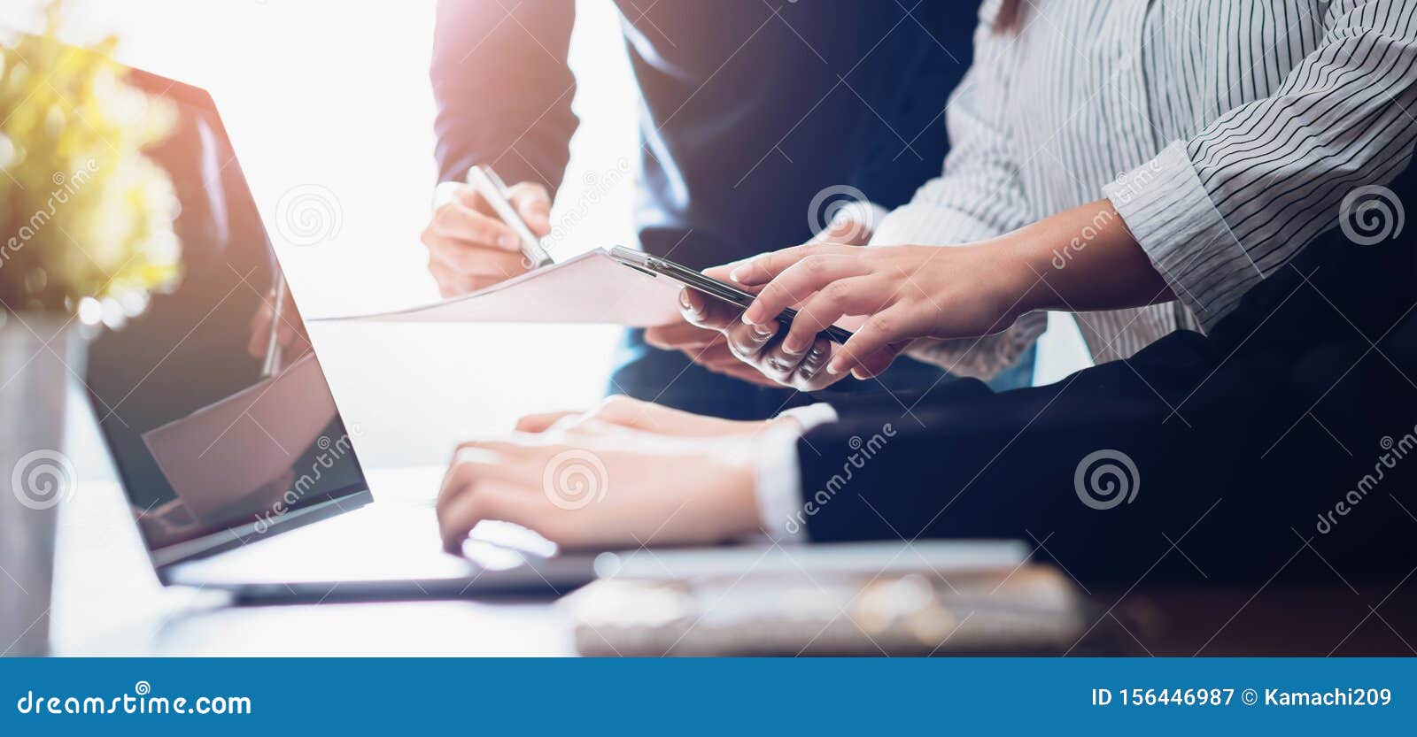 Teamwork Working on Laptop Computer and Smartphone in Creative Office ...