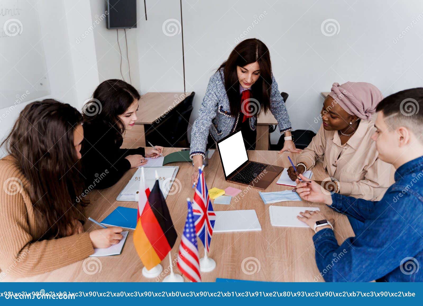 Teamwork. Working in Multiethnic Group of Students. Teacher Study ...