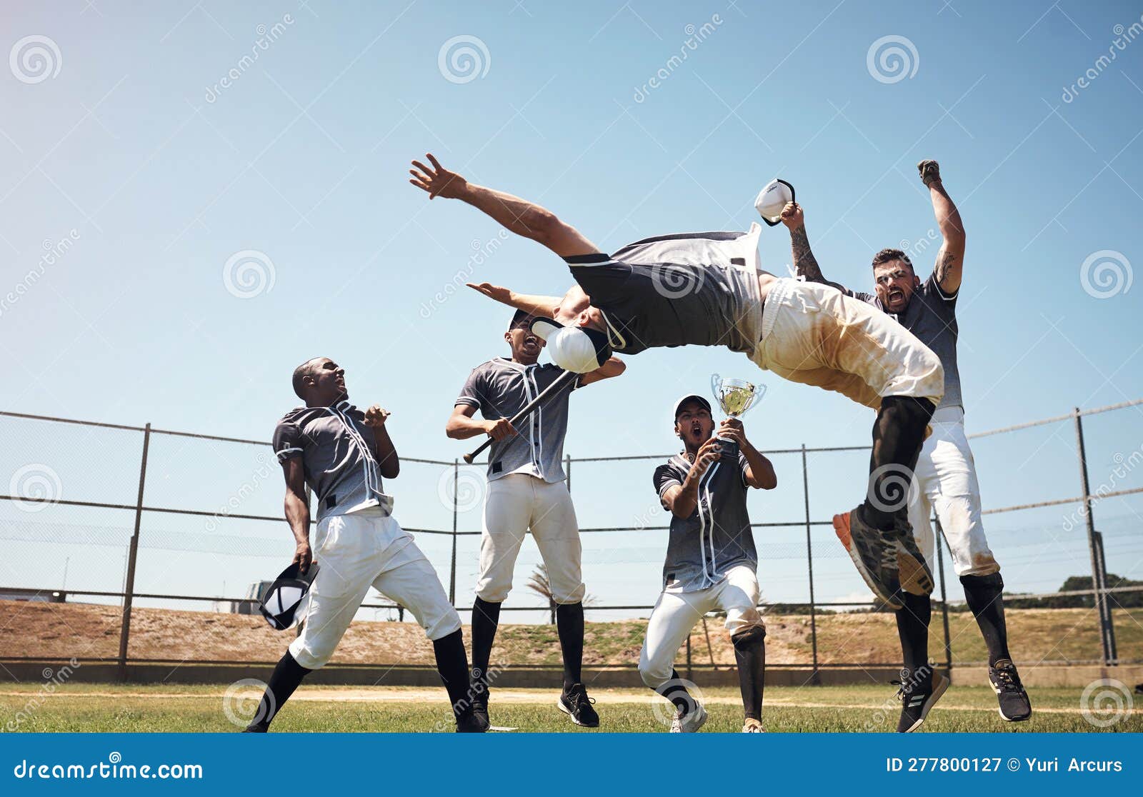 Teamwork is Worth the Win. a Group of Young Baseball Players ...
