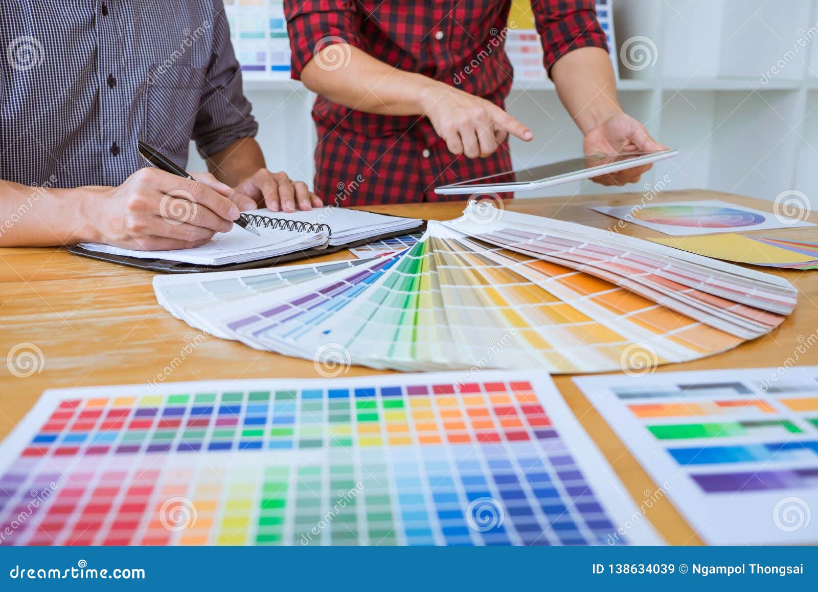 Teamwork of Young Creative Designers Working on Project Together and ...